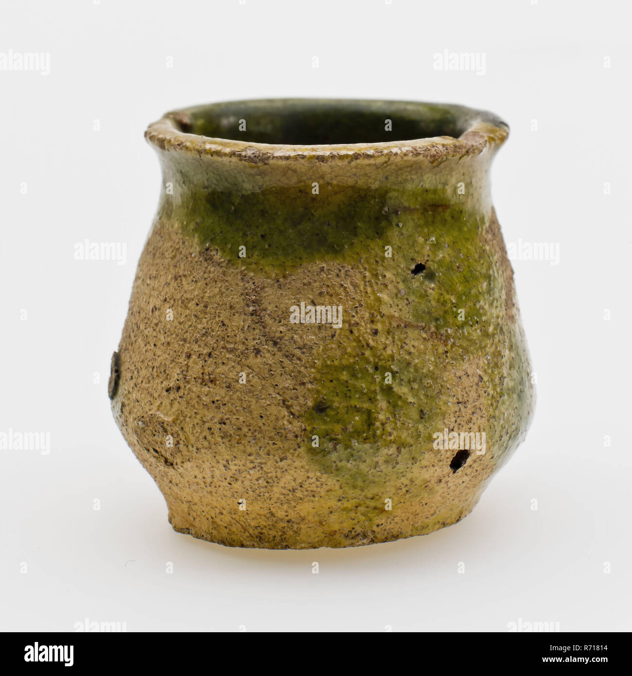 Pottery belly model ointment jar, gray shard, dark green glazed ...