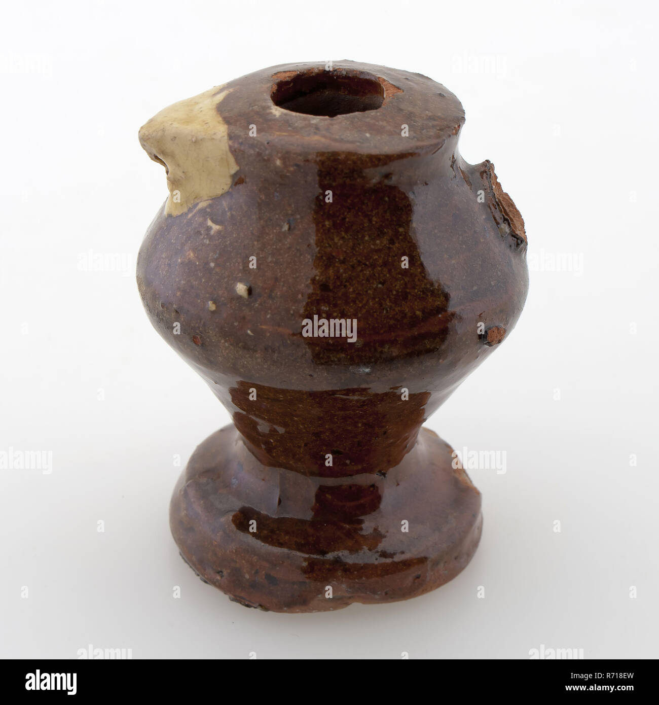 Pottery flute in the form of double conical cup, spout and stand, flute ...