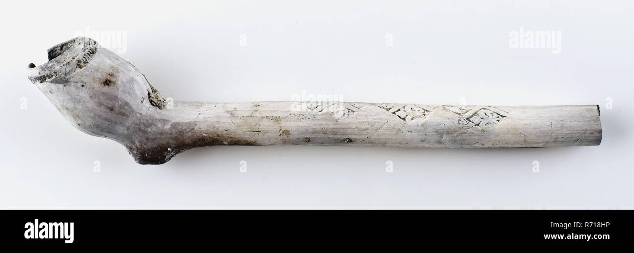 Clay pipe, unnoticed, stem decorated with fleur de lis stamps, clay ...