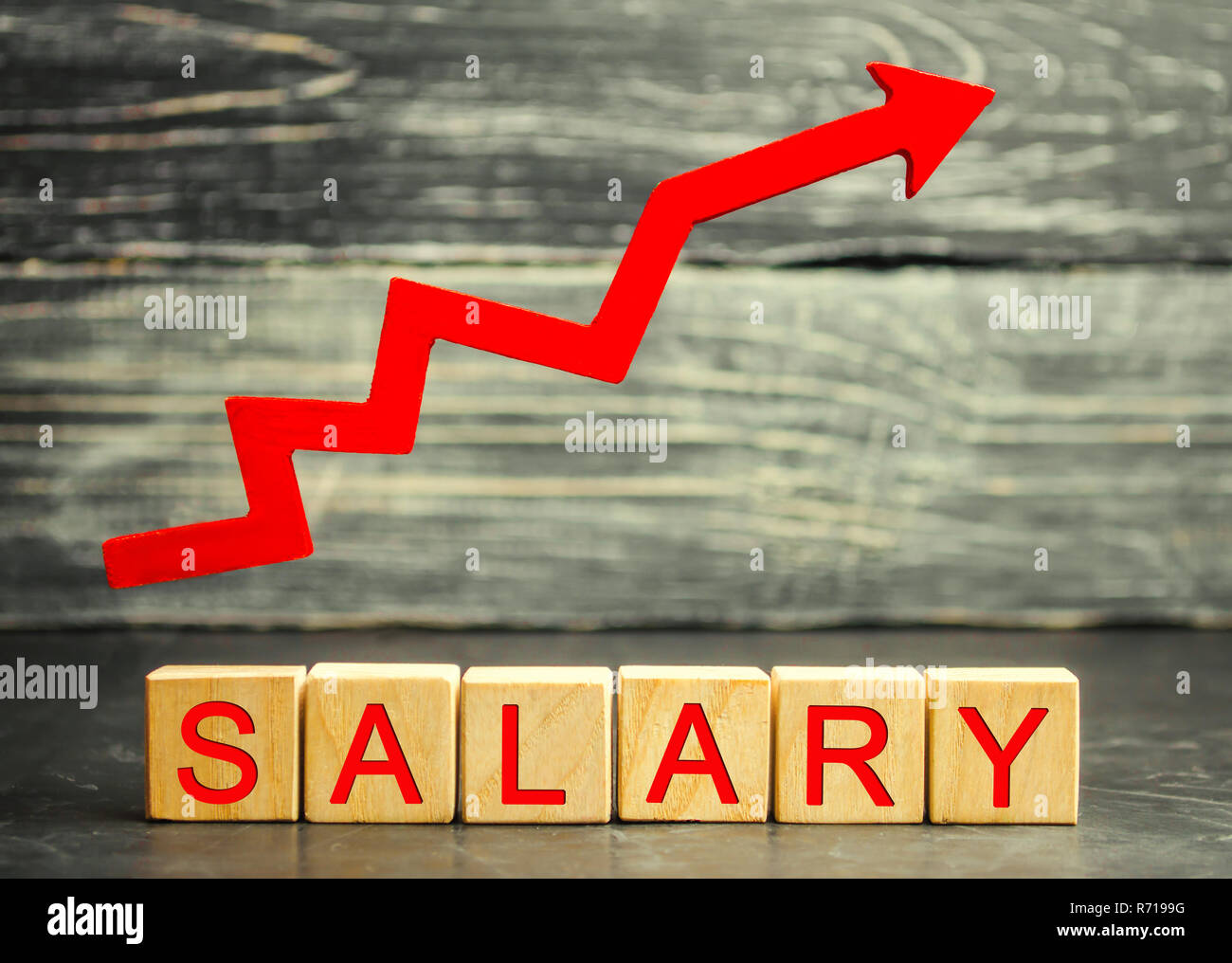 The inscription salary and the red arrow up. increase of salary, wage ...