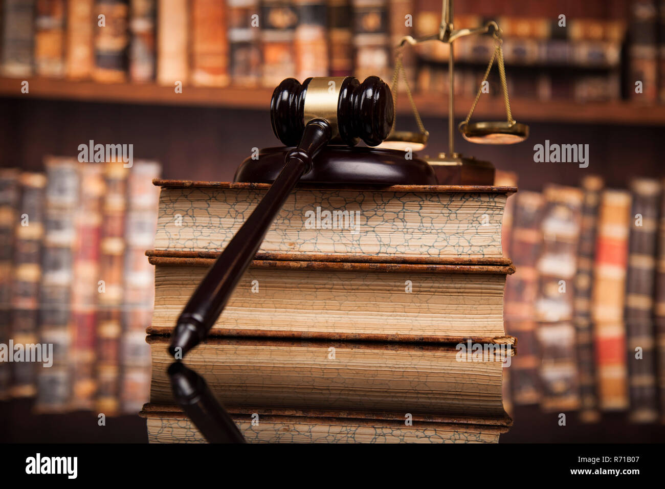 Law books, mallet of the judge, Courtroom background Stock Photo - Alamy