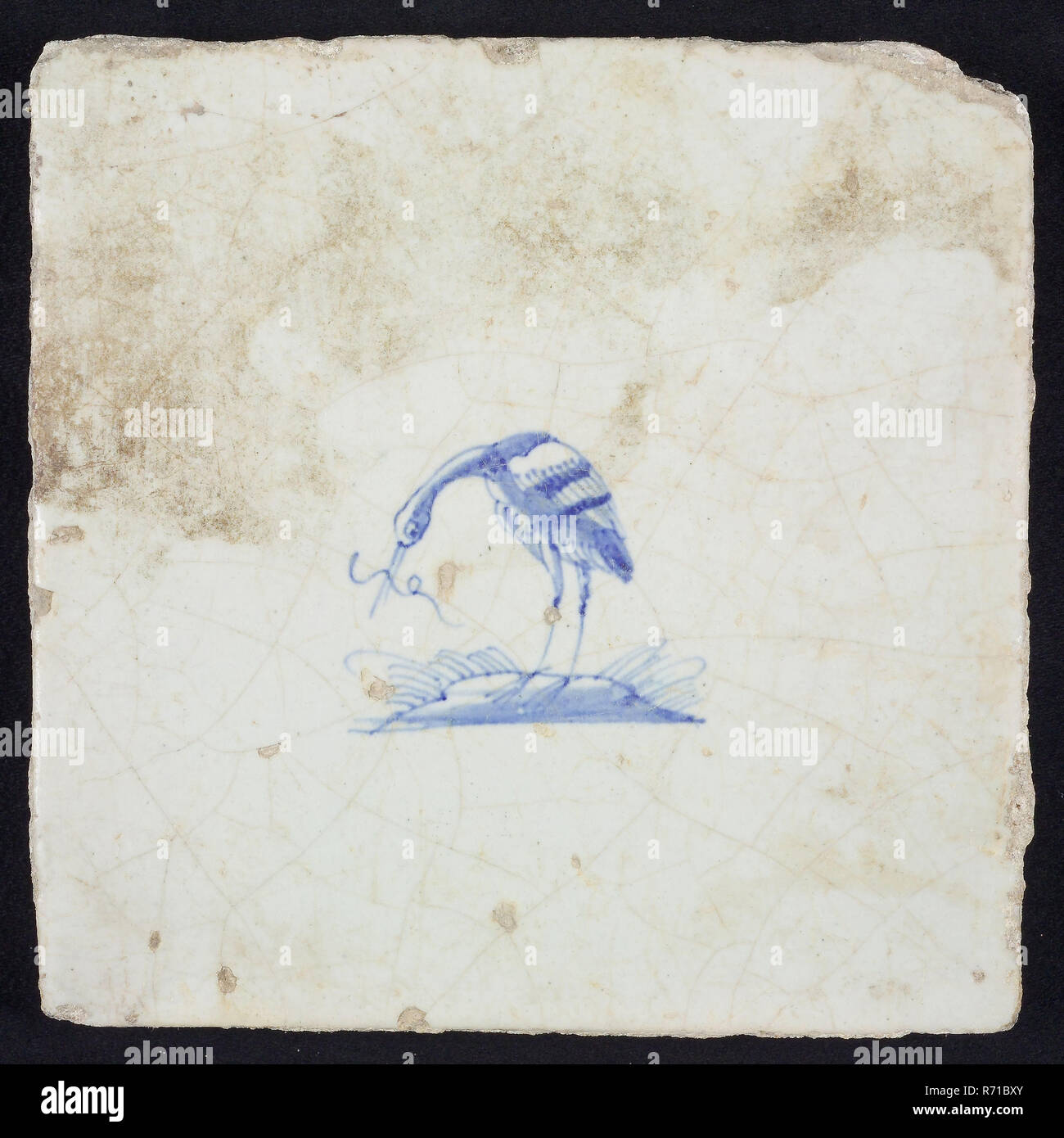 Animal tile, bird on plot with long fish in its beak to the left, blue ...