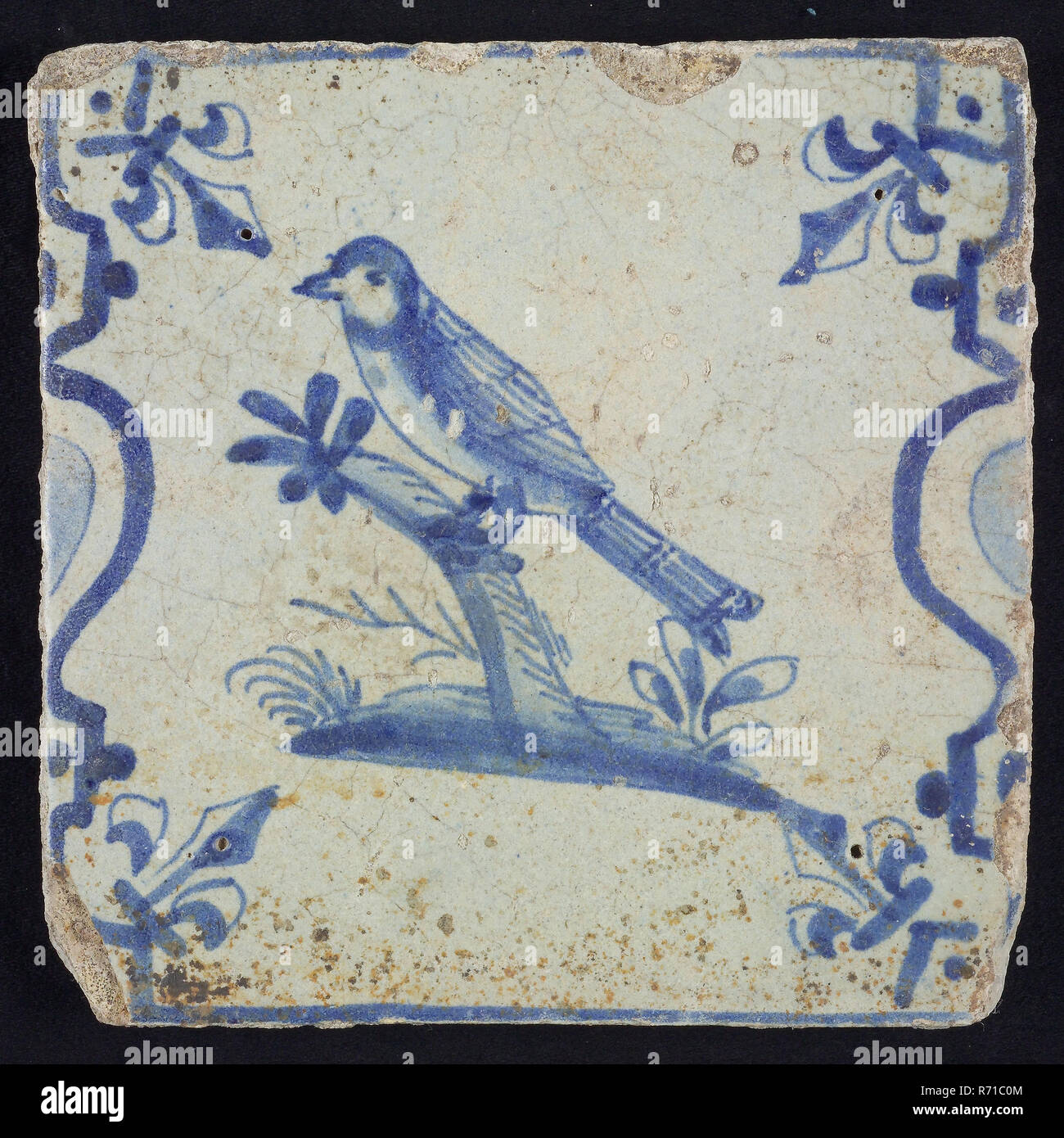Animal tile, bird on branch on plot to the left between balusters in ...