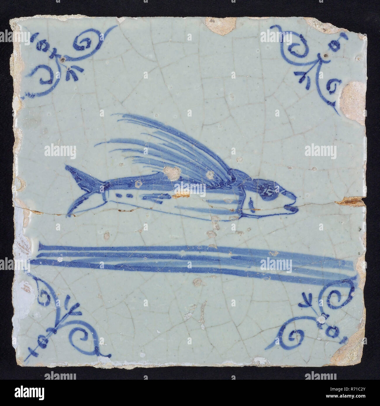 Animal tile, flying fish above running water to the right, in blue on ...