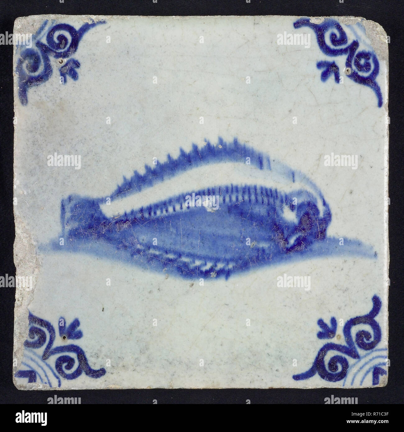 Animal tile, unknown fish in water to the right, in blue on white ...