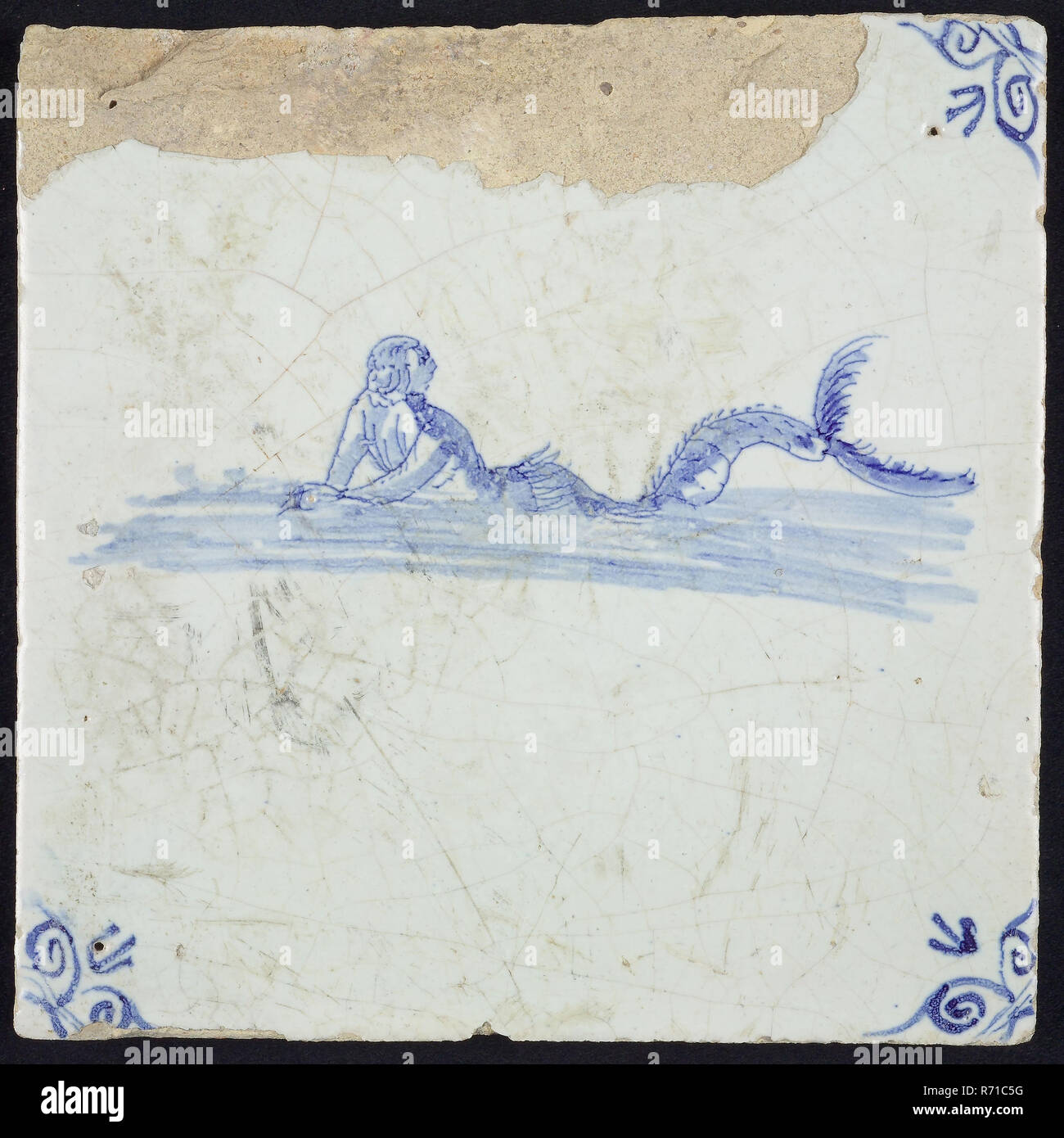 Sea creature tile, man with fish tail in water to the left, in blue on ...