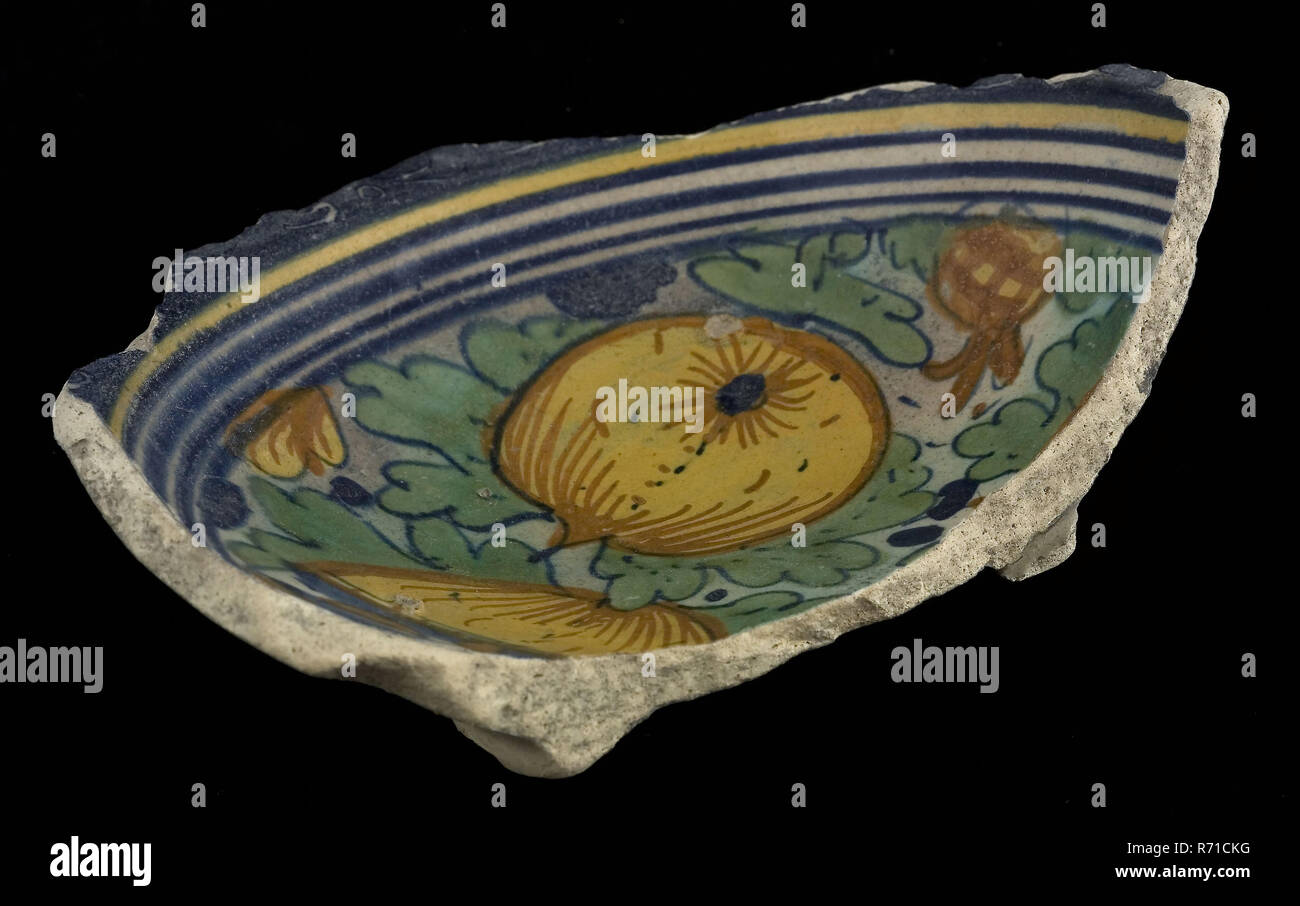 Fragment majolica bowl, polychrome, decor of pomegranates, rim with ...