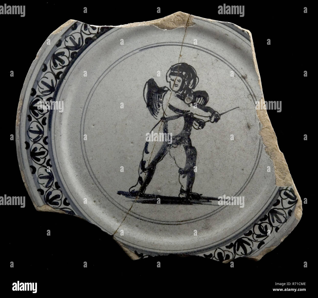 Fragment faience plate, blue on white, cherub or putto with stick ...