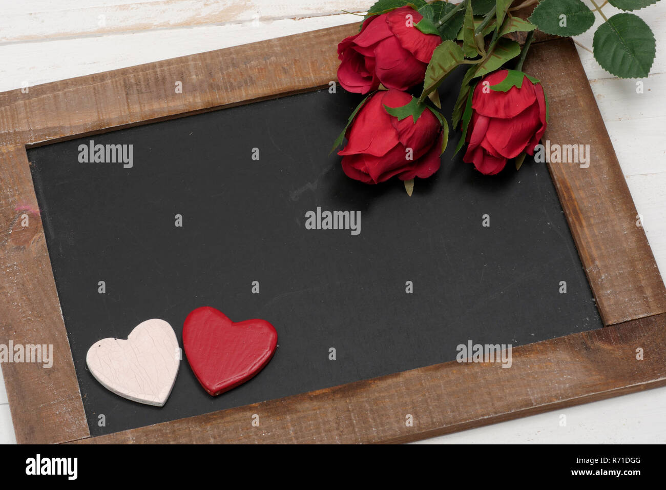 concept romantic, small chalkboard, roses and heart Stock Photo - Alamy
