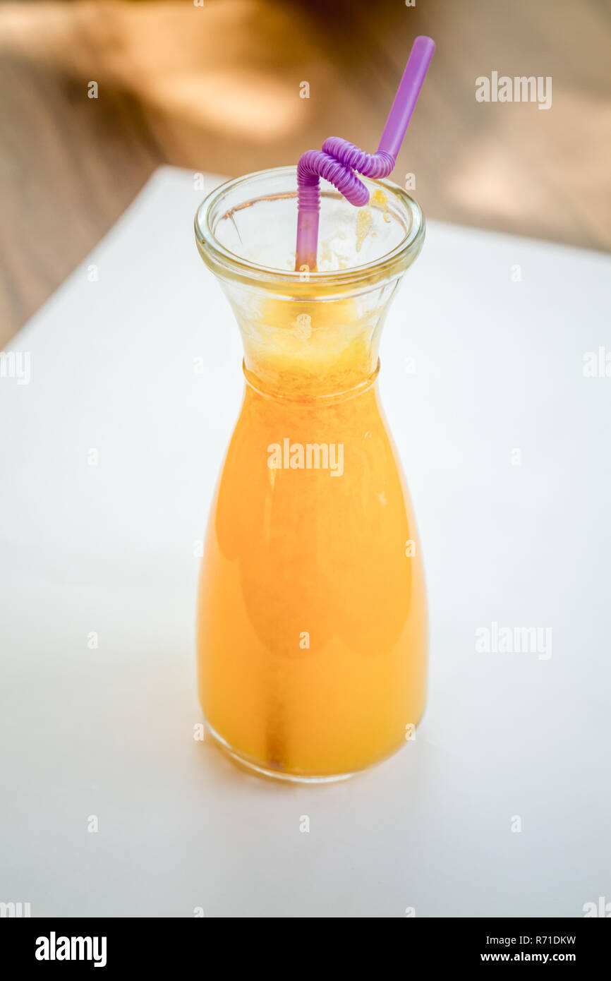 Natural Orange Juice and Straw in a Glass Pitcher Stock Photo - Alamy