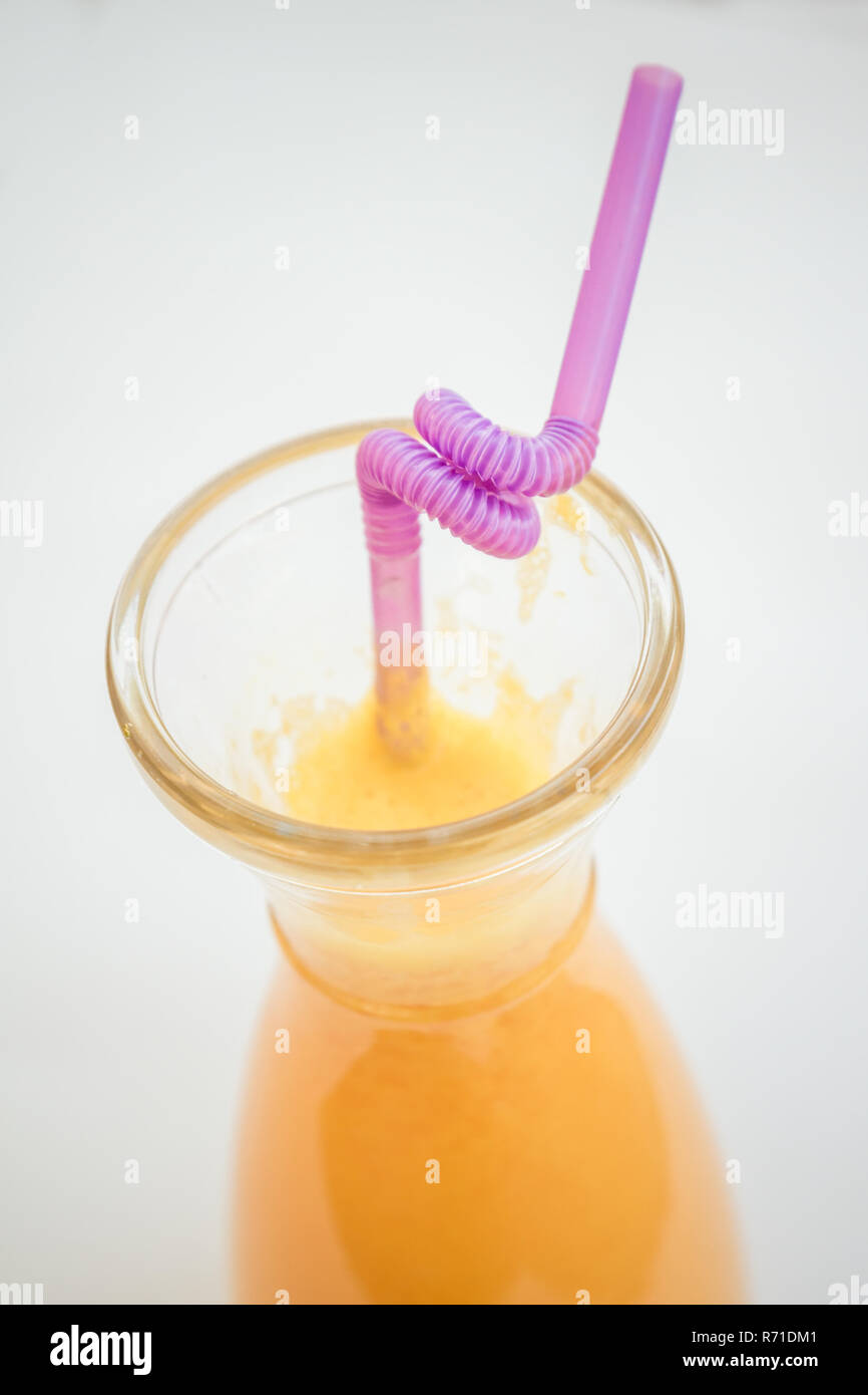 Natural Orange Juice and Straw in a Glass Pitcher Stock Photo - Alamy