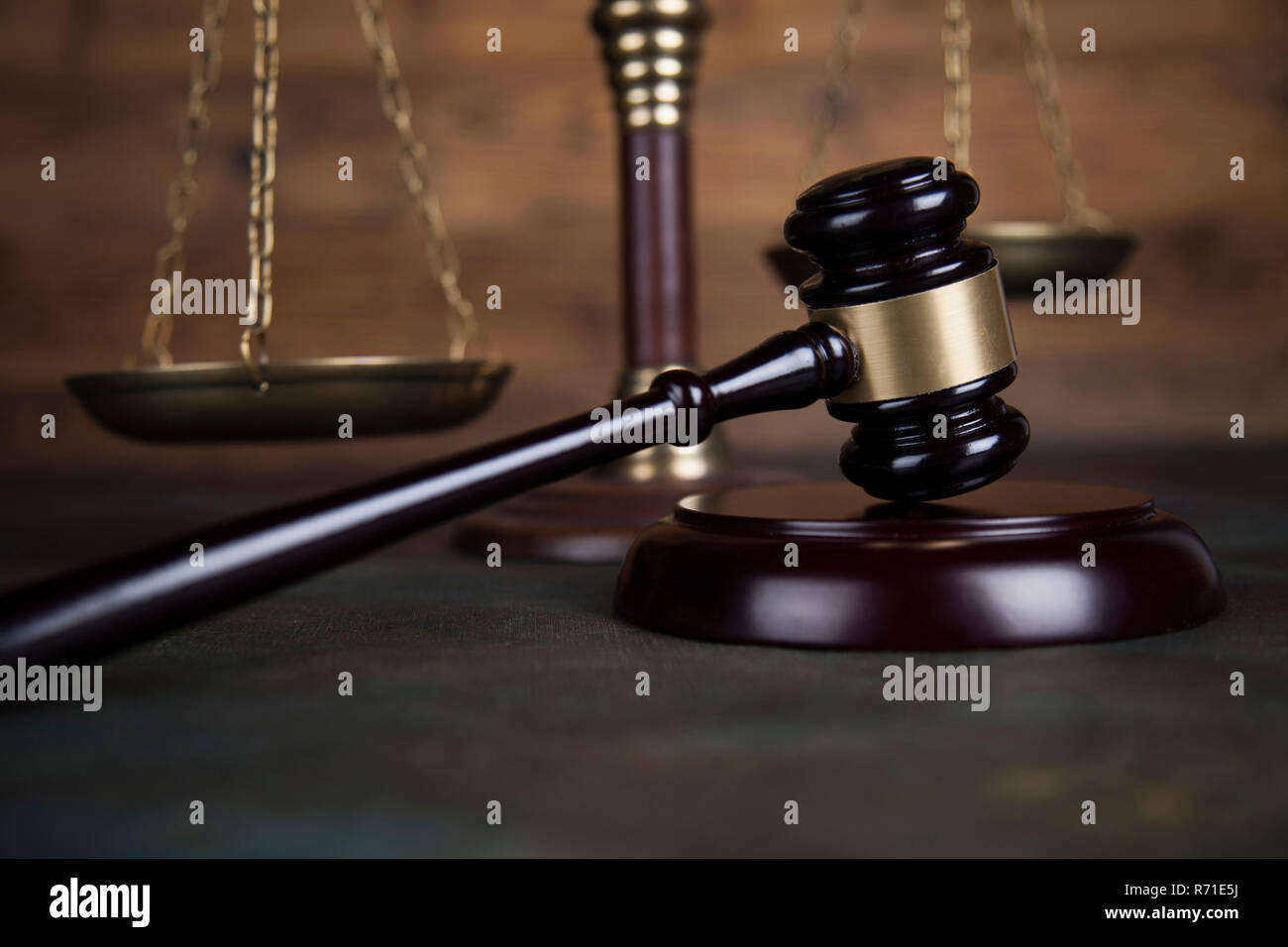 Law theme, mallet of the judge, wooden desk background Stock Photo - Alamy