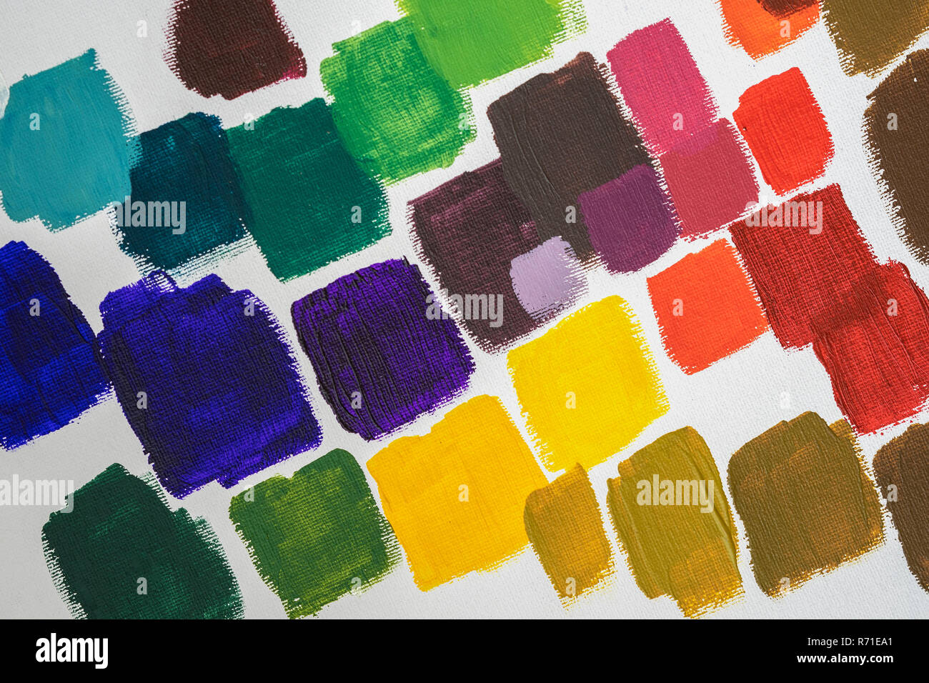 Set of different bright smears of paints on white palette, abstract ...