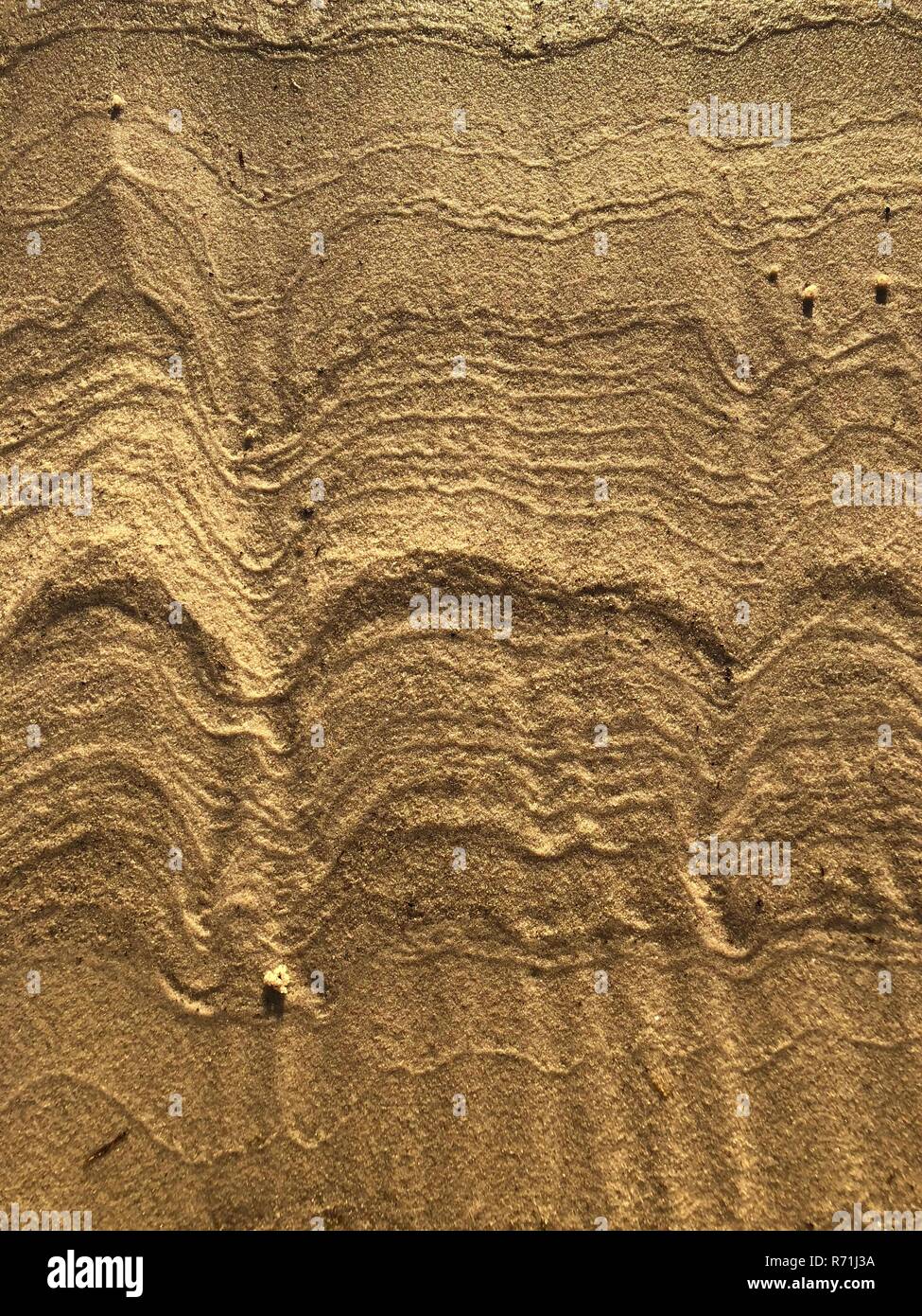 Water and sand creating patterns like dripping melting textures Stock ...
