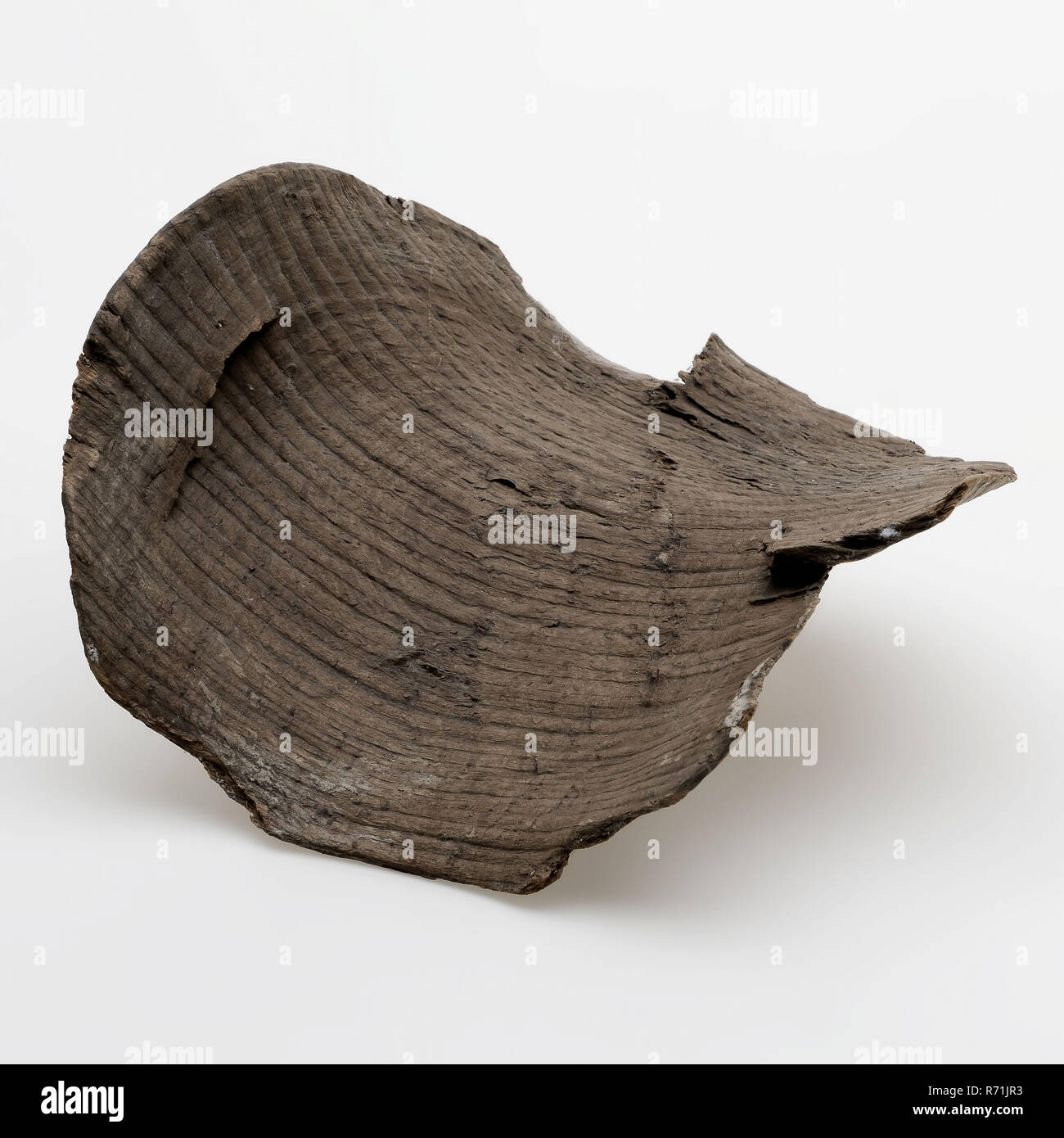 Fragment of small wooden sign on stand, plate crockery holder soil find ...