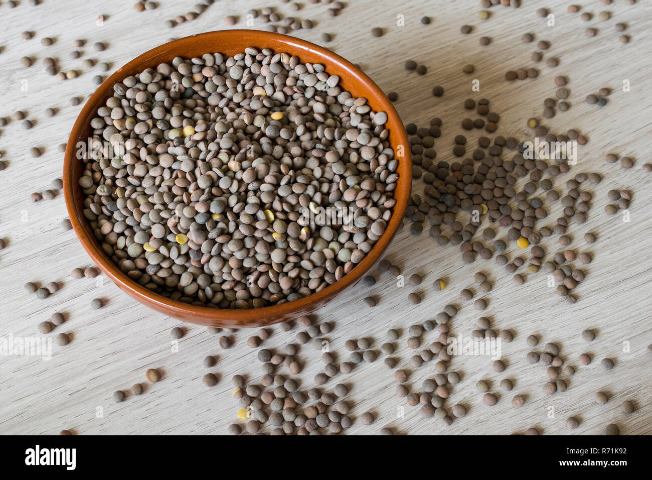 Lentils in bowl on table hi-res stock photography and images - Alamy