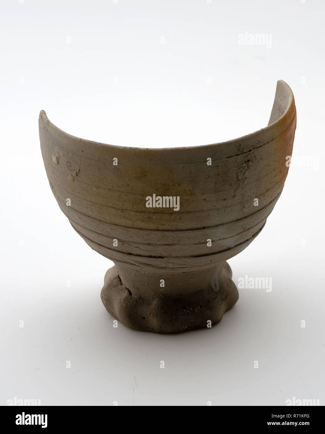 Fragment stoneware cup on pinched foot, hemisphere model on narrow foot ...