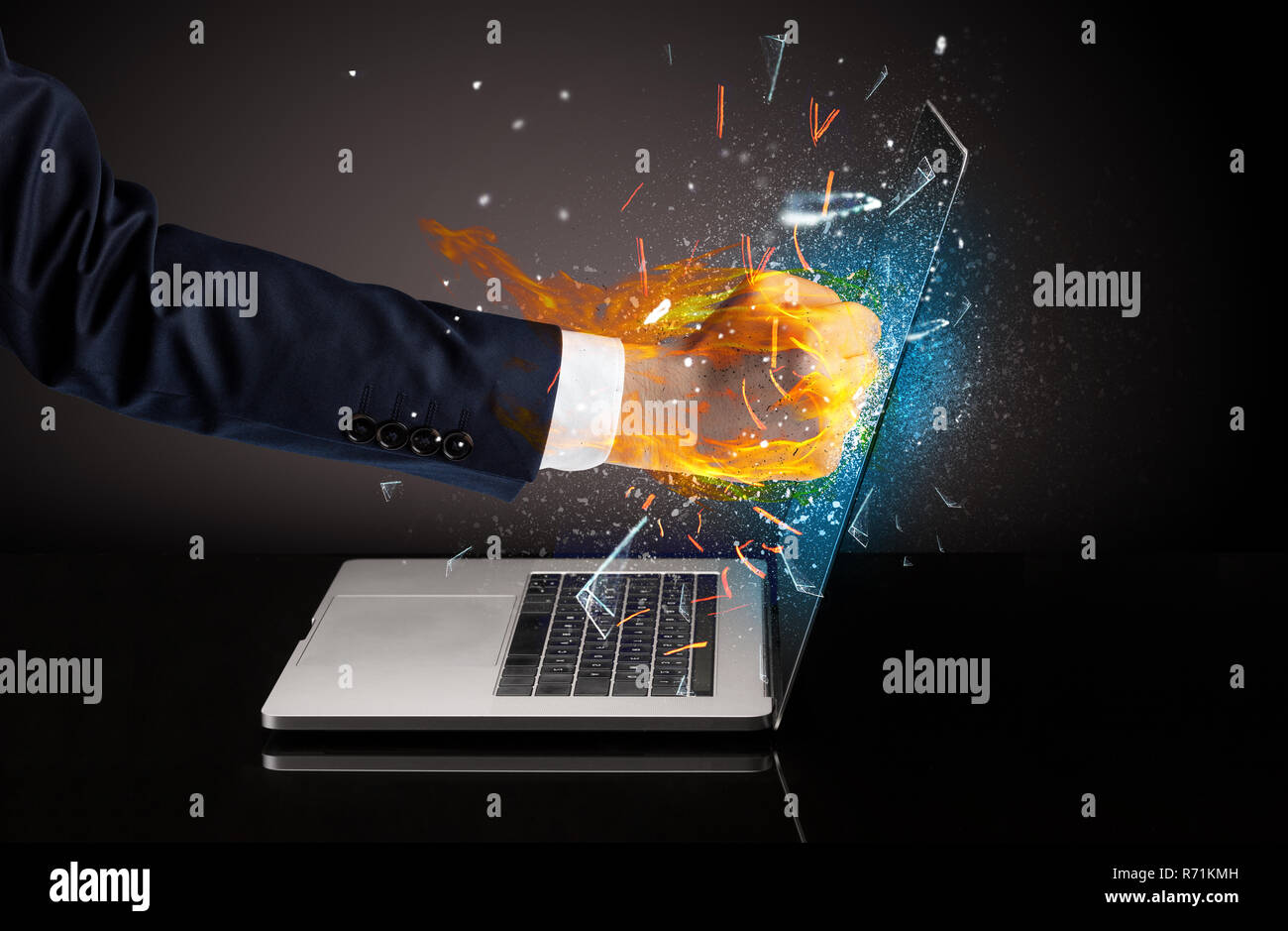 Firing hand hitting strongly laptop screen glass Stock Photo - Alamy