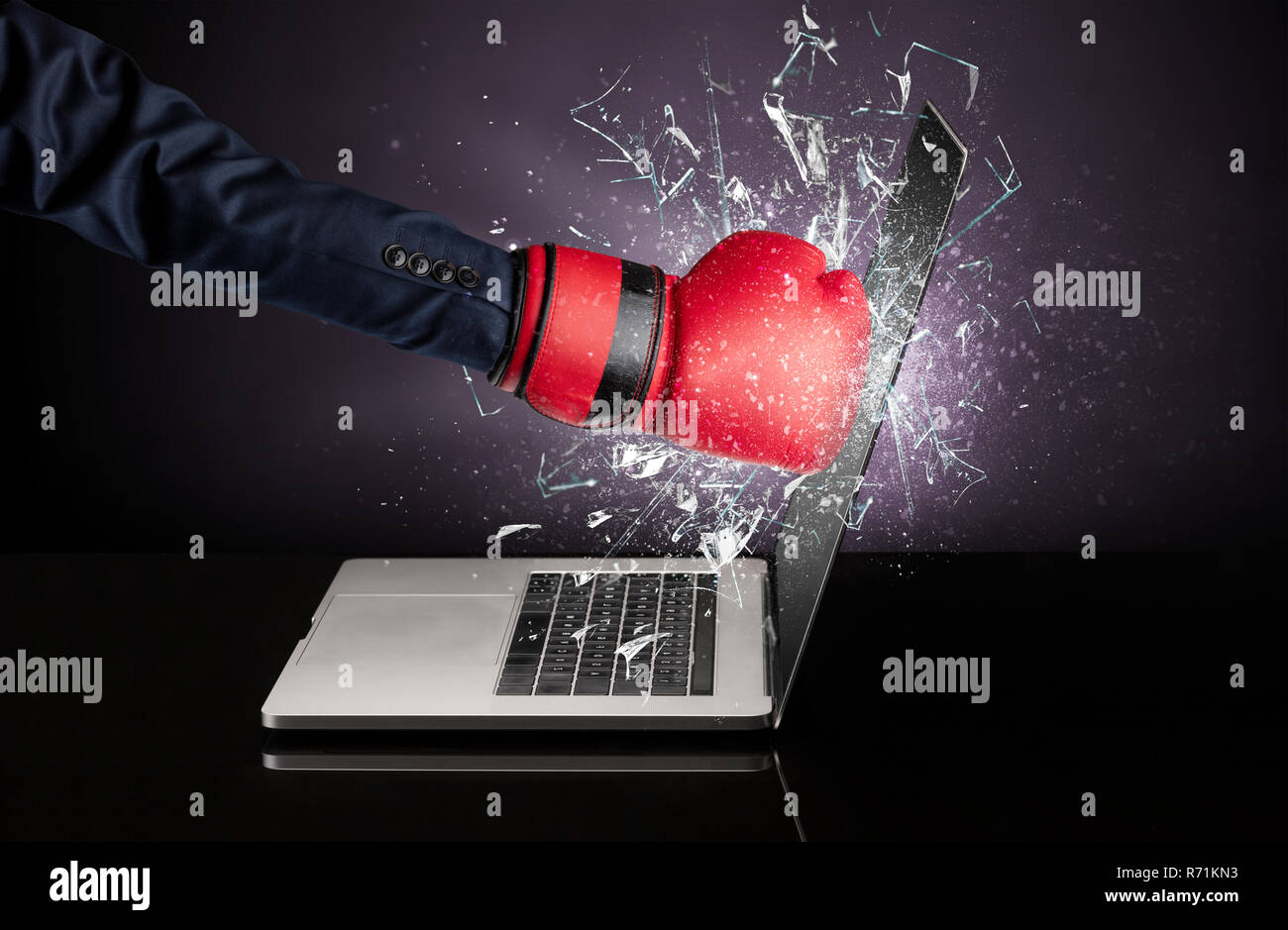 Hand hitting strongly laptop screen glass Stock Photo - Alamy