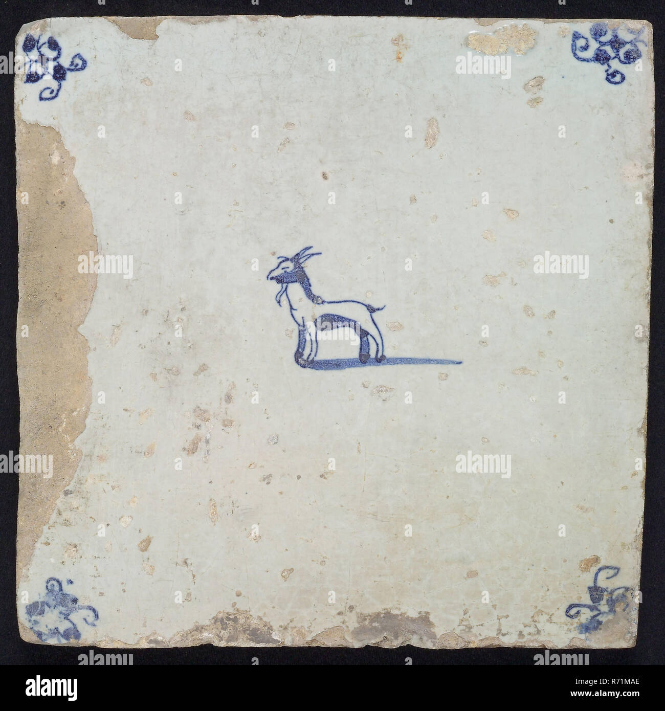Animal tile with goat, blue decor on white ground, corner fill spider ...