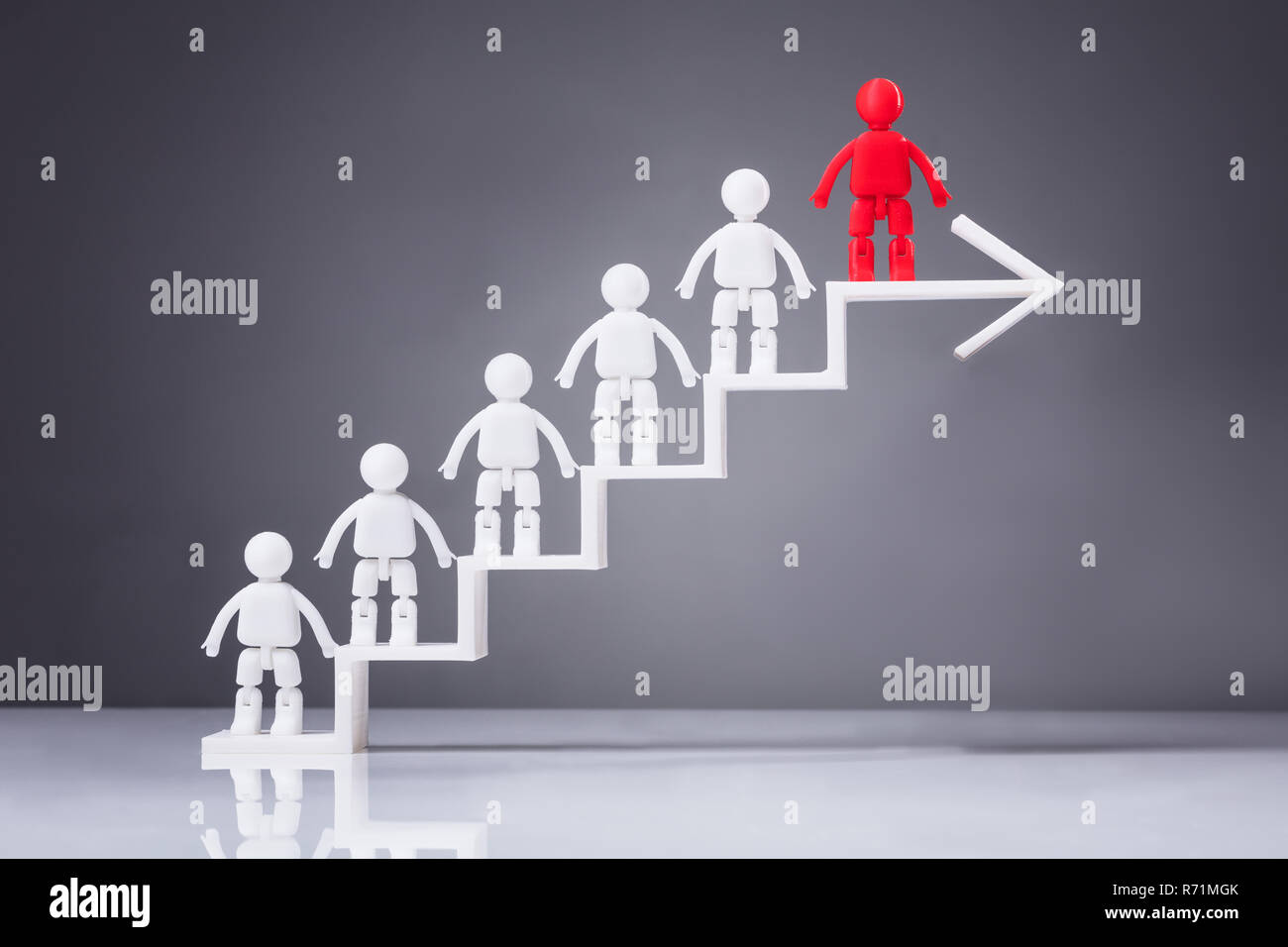 Human Figure On White Arrow Stock Photo - Alamy