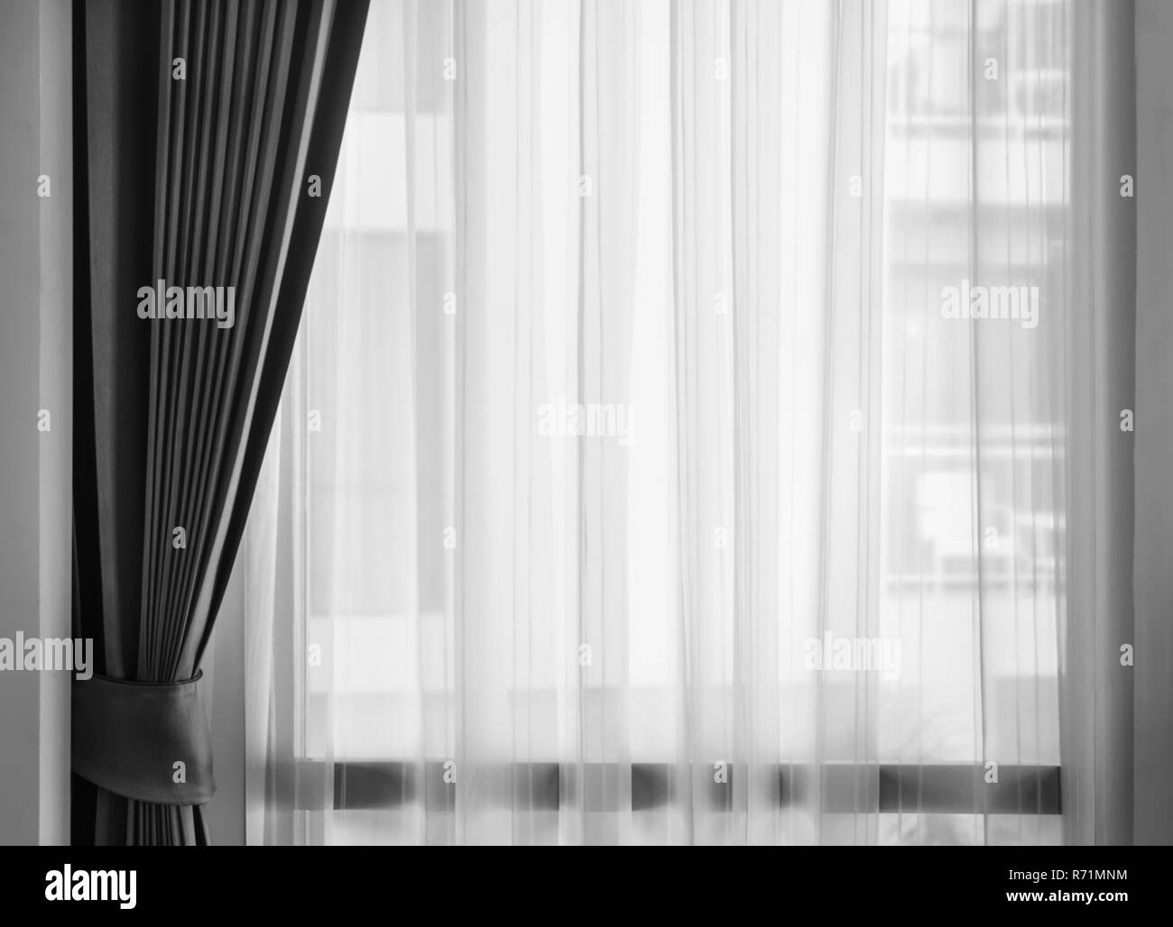 Glass window with white translucent curtain Stock Photo - Alamy