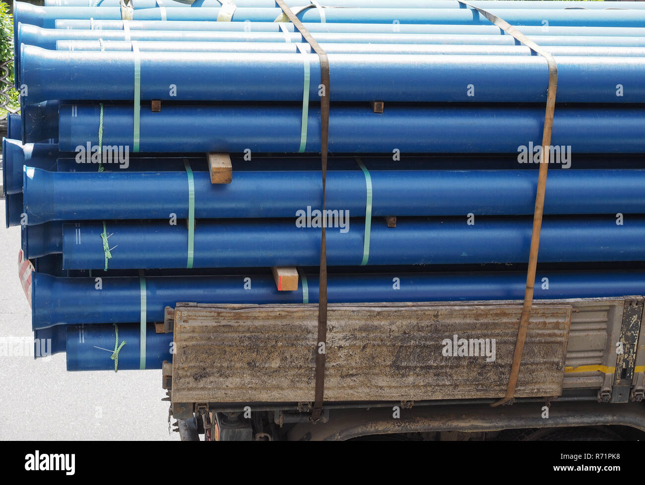 blue pipes on lorry Stock Photo - Alamy
