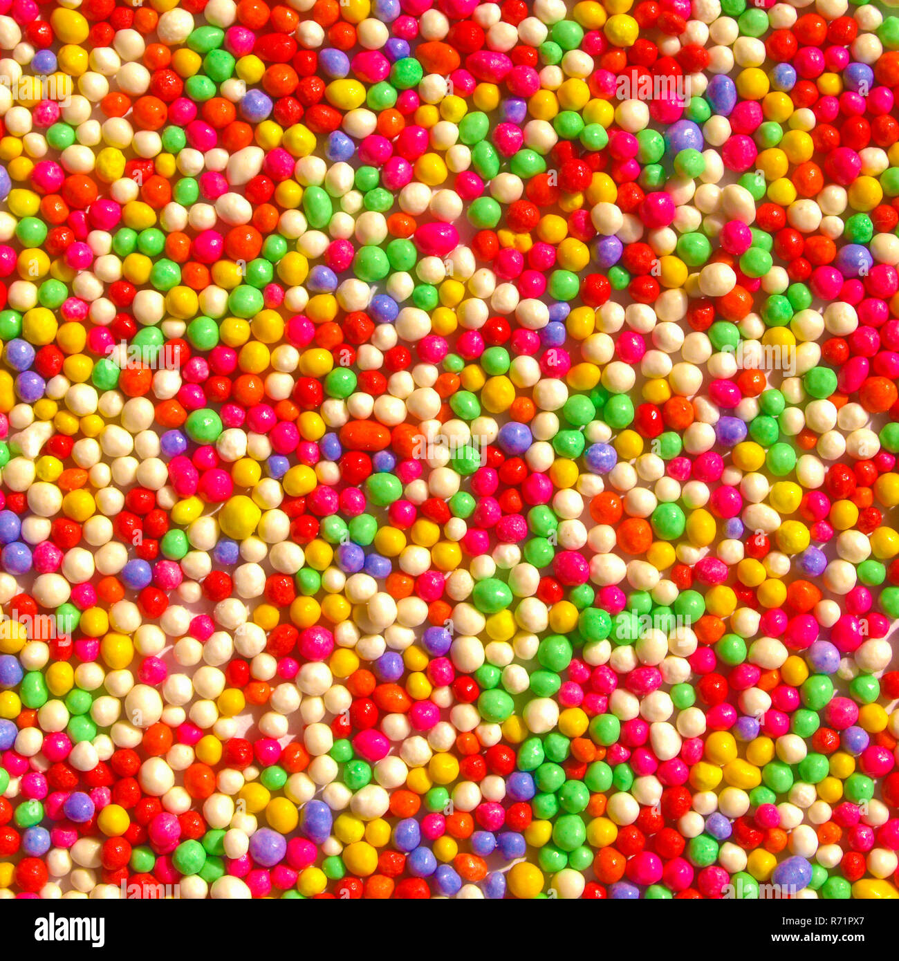 Coloured sugar background Stock Photo - Alamy