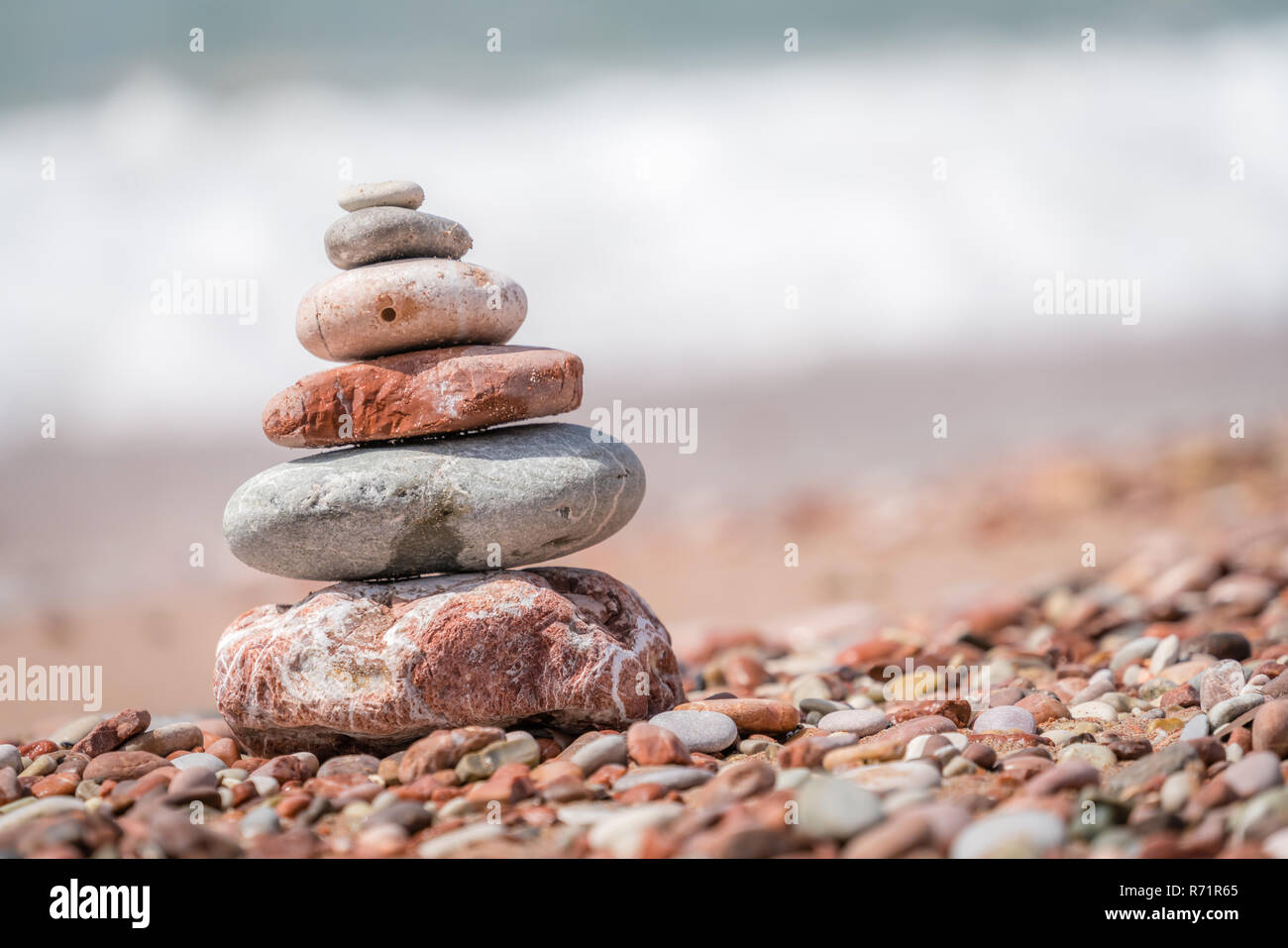 Balancing colorful zen stones hi-res stock photography and images - Alamy