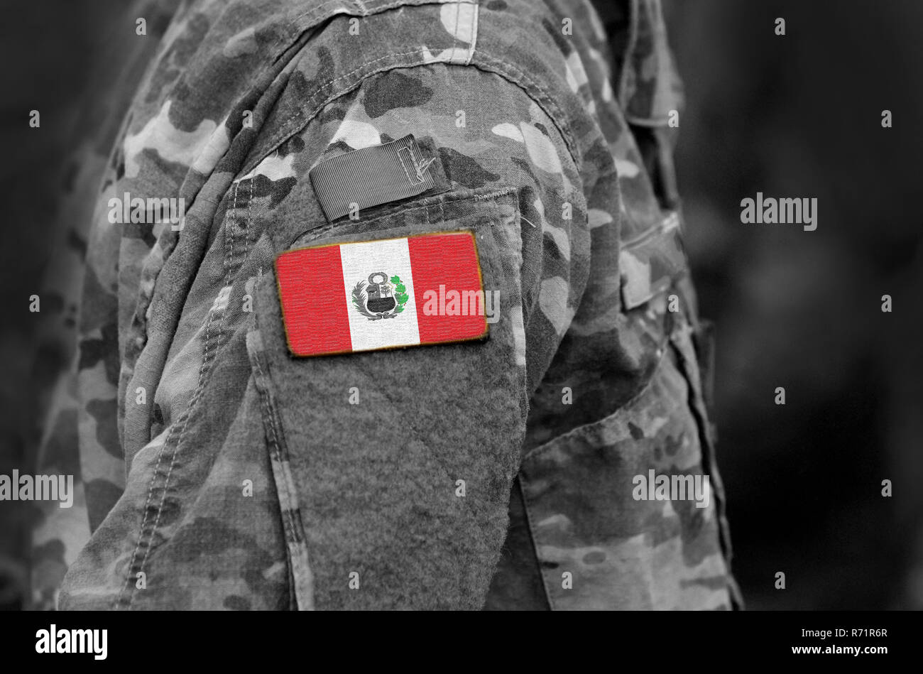 Flag of Peru on soldiers arm. Flag of Peru on military uniforms ...
