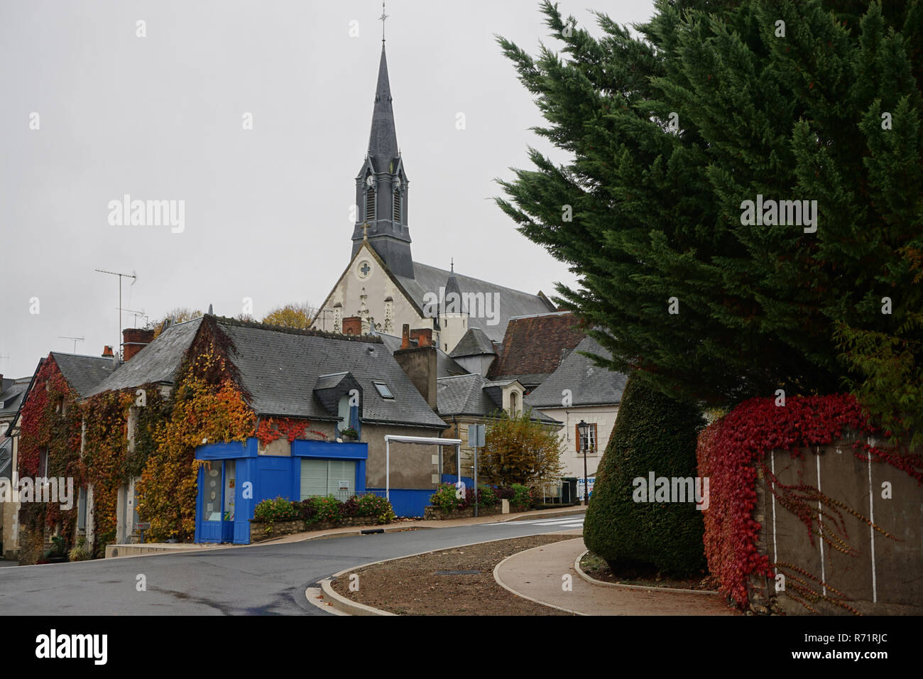 Side view of a typical small street and buildings in a village on a ...