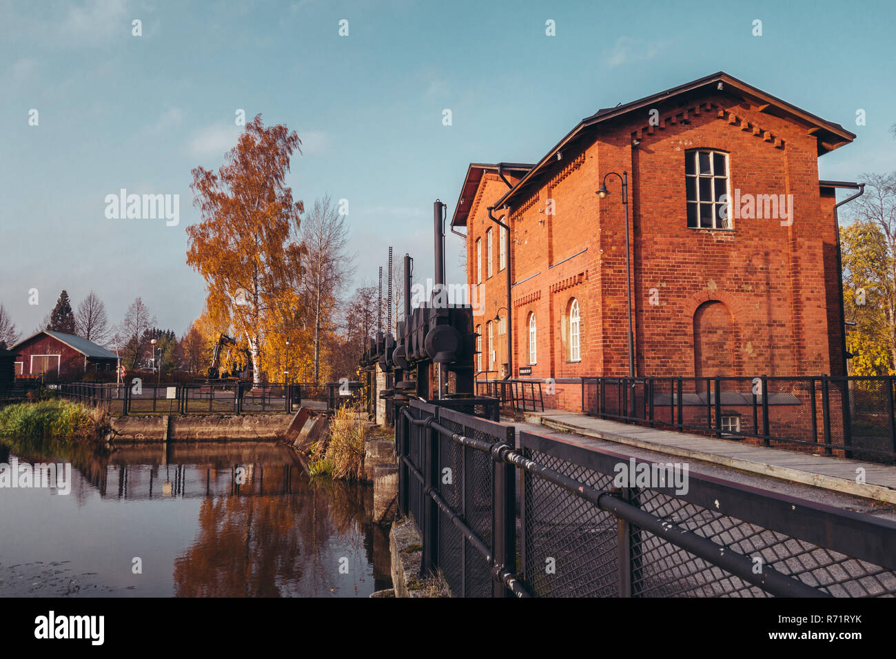 Old hydroelectric dam and its building in Forssa Finland at sunset on ...
