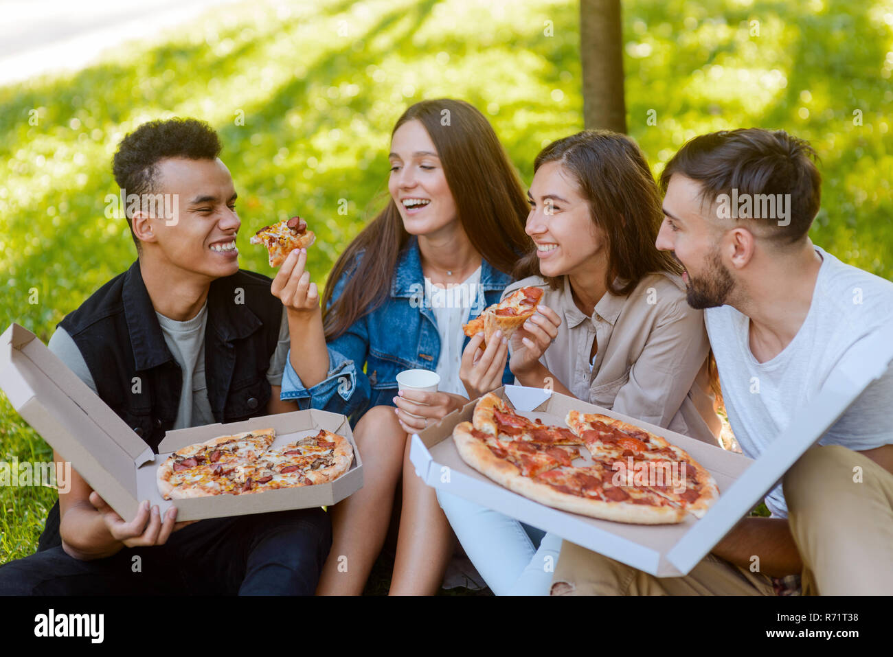 Two couples spending time together Stock Photo - Alamy