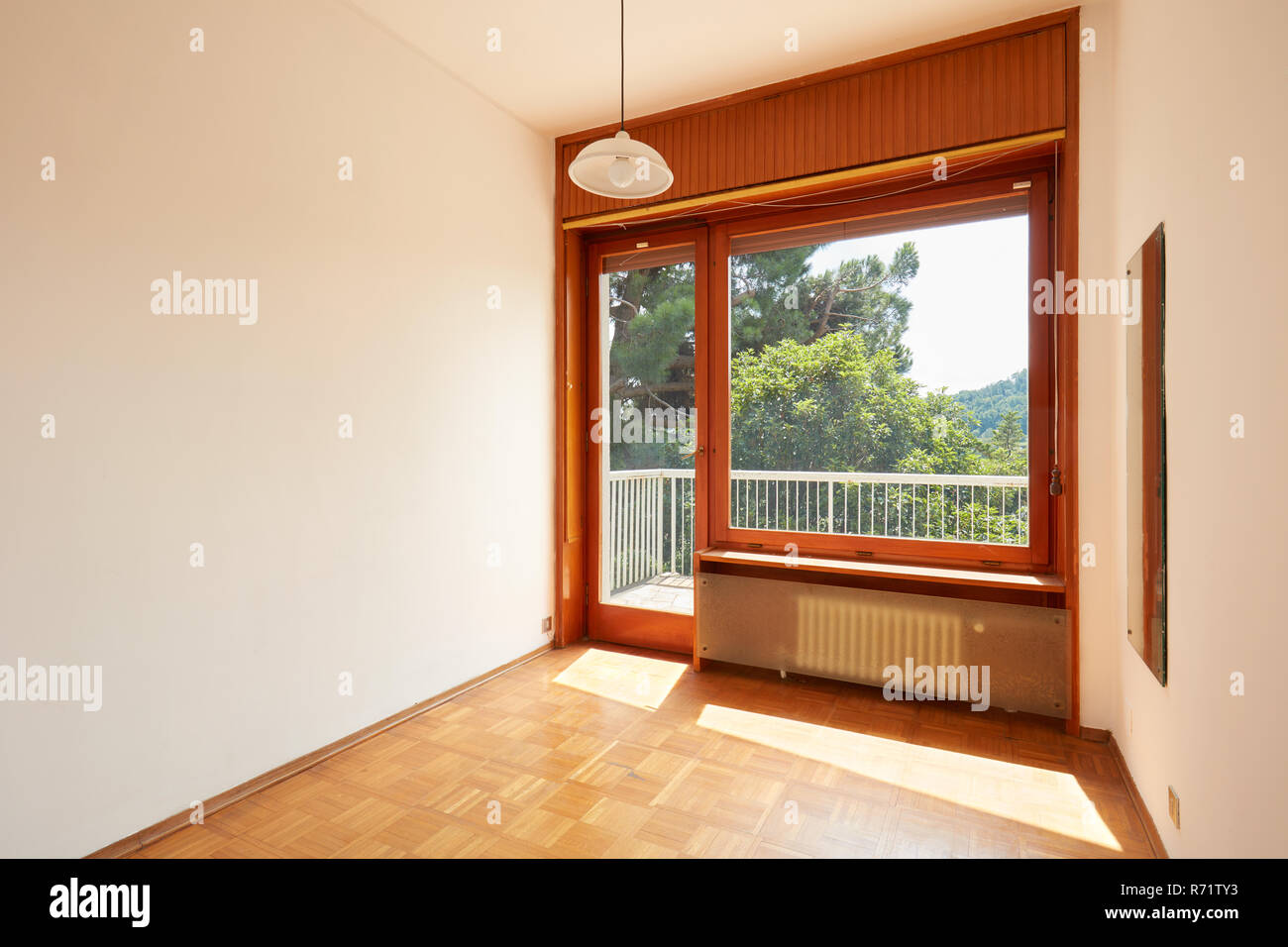 Empty, sunny room interior with wooden floor in country house Stock ...