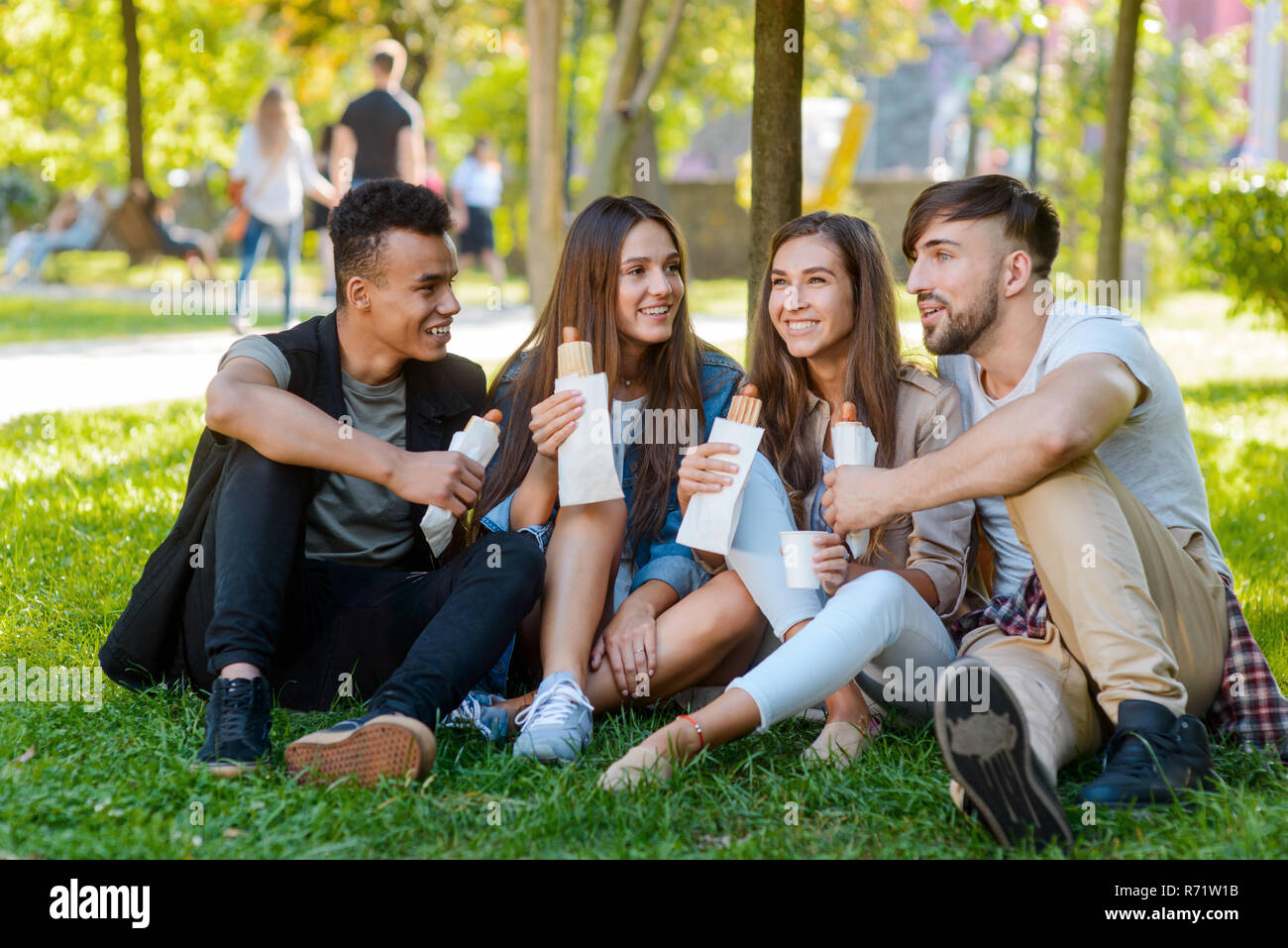 Summer evening with best friends Stock Photo - Alamy