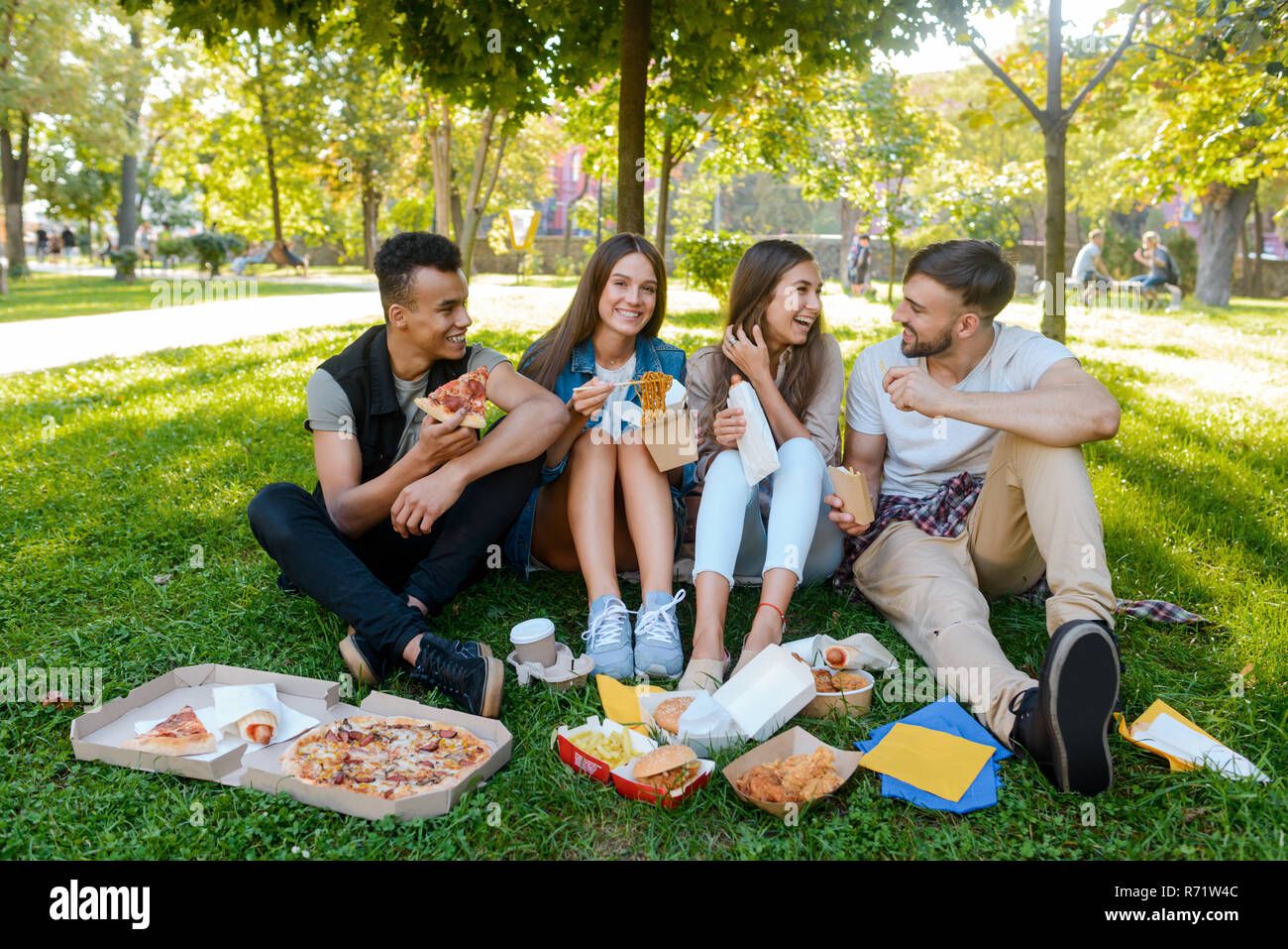 Fat boy eating fast food hi-res stock photography and images - Alamy