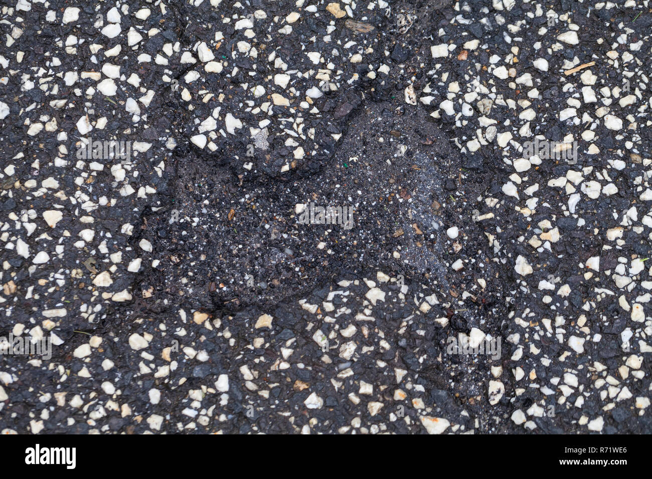 Picture of pothole in road Romania Stock Photo - Alamy