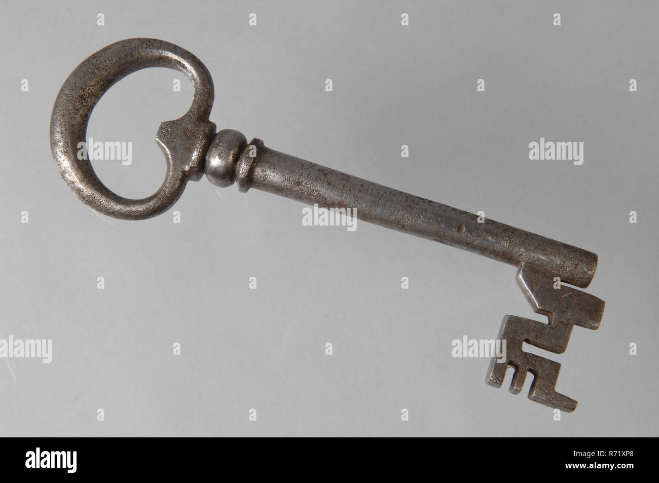 Iron key with heart-shaped eye, solid key handle, collar and cruciform ...