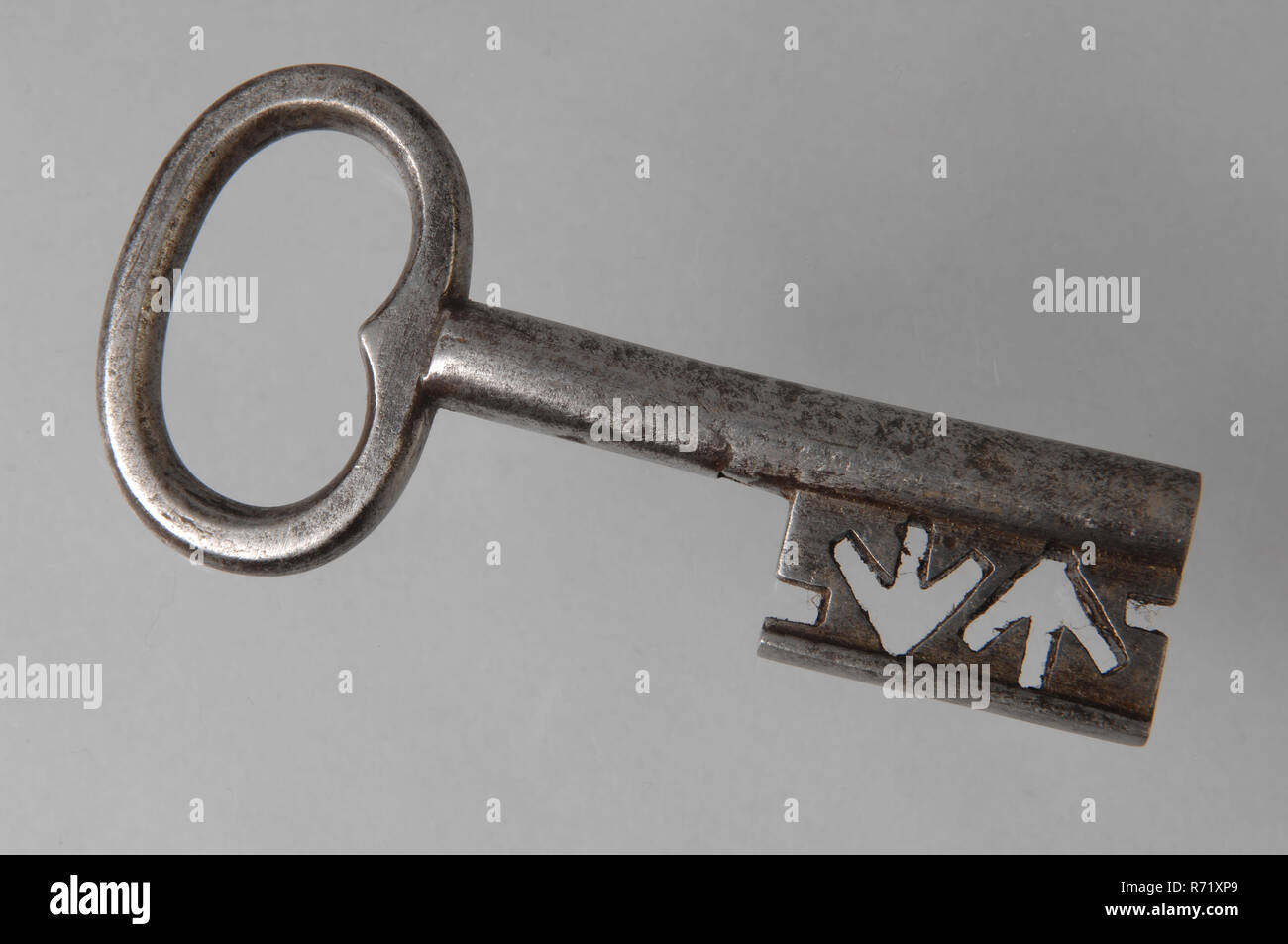 Iron key with heart-shaped eye, hollow key handle and cruciform beards ...