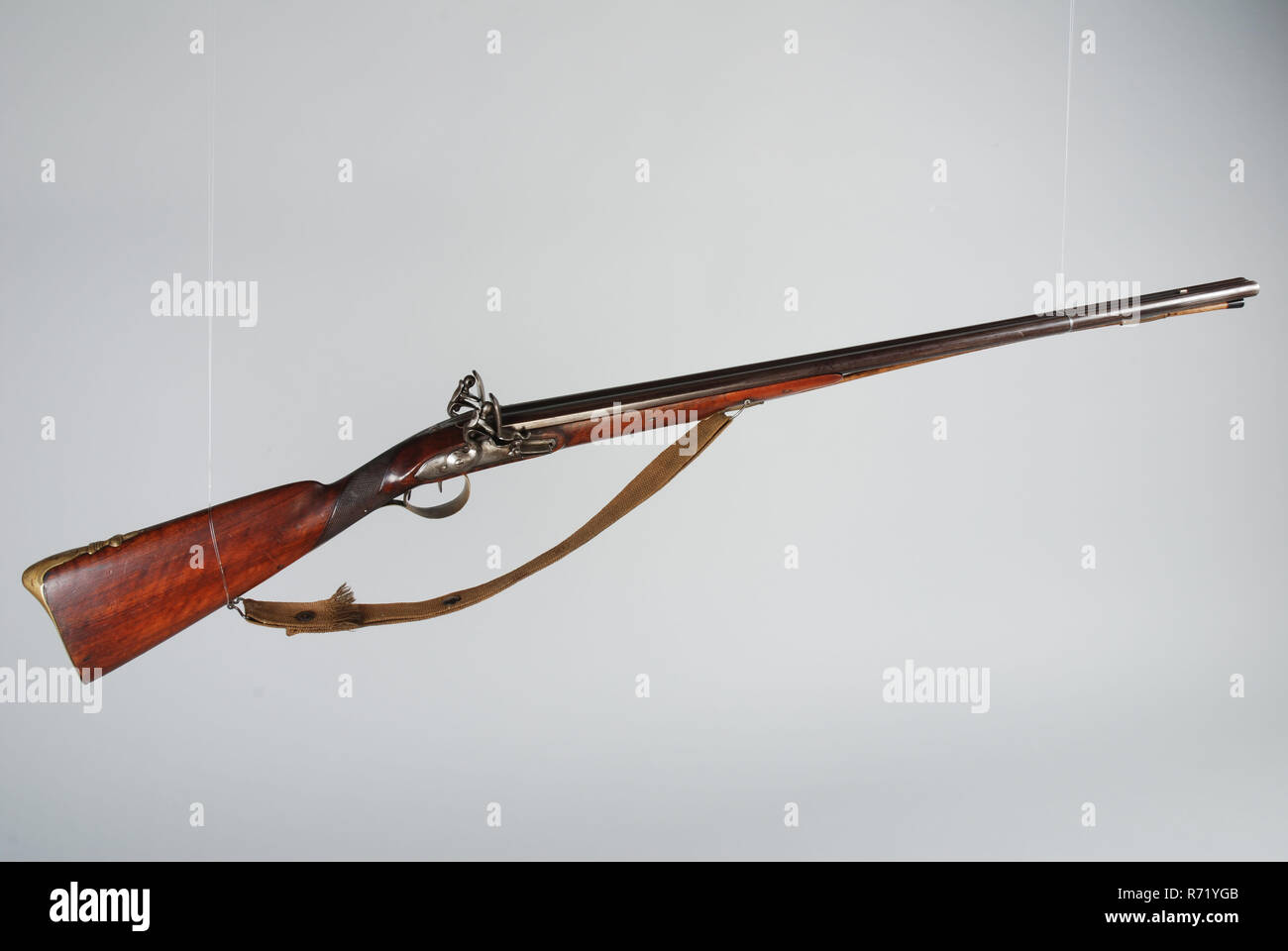 Double-barreled flint gun with two separate locks and tractors and ...