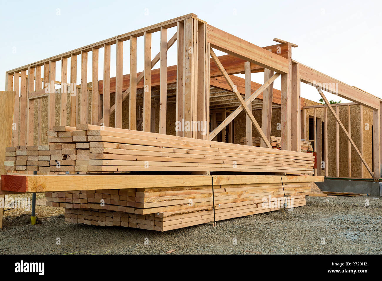 Wood Lumber by House Construction Stock Photo - Alamy