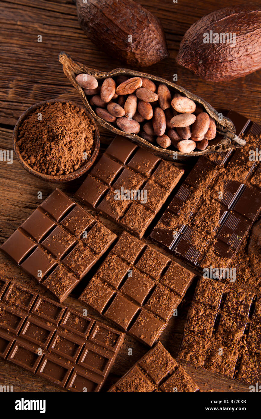 Chocolate bar, candy sweet, dessert food on wooden background Stock ...