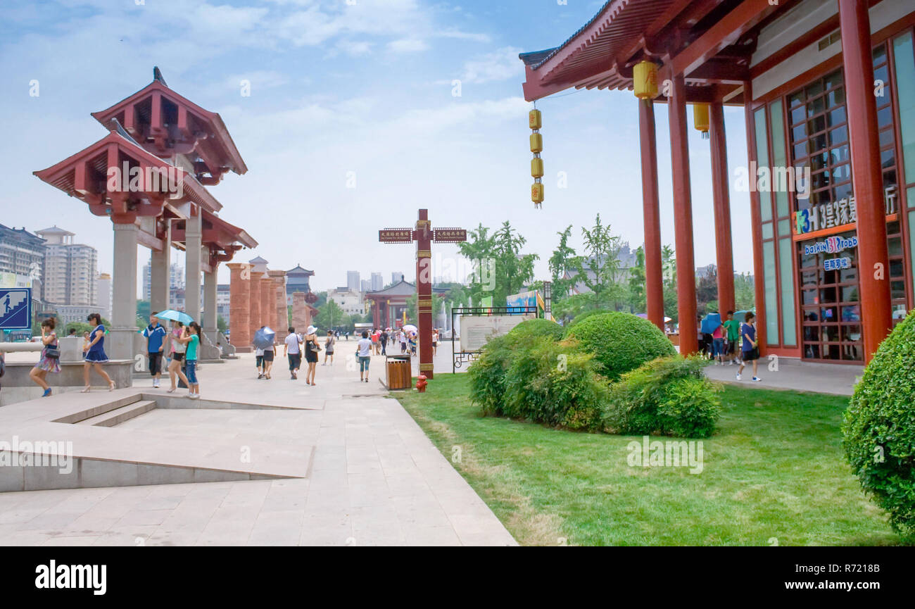 Local people and tourists walkin in Dayan Pagoda Square. Xian, China ...