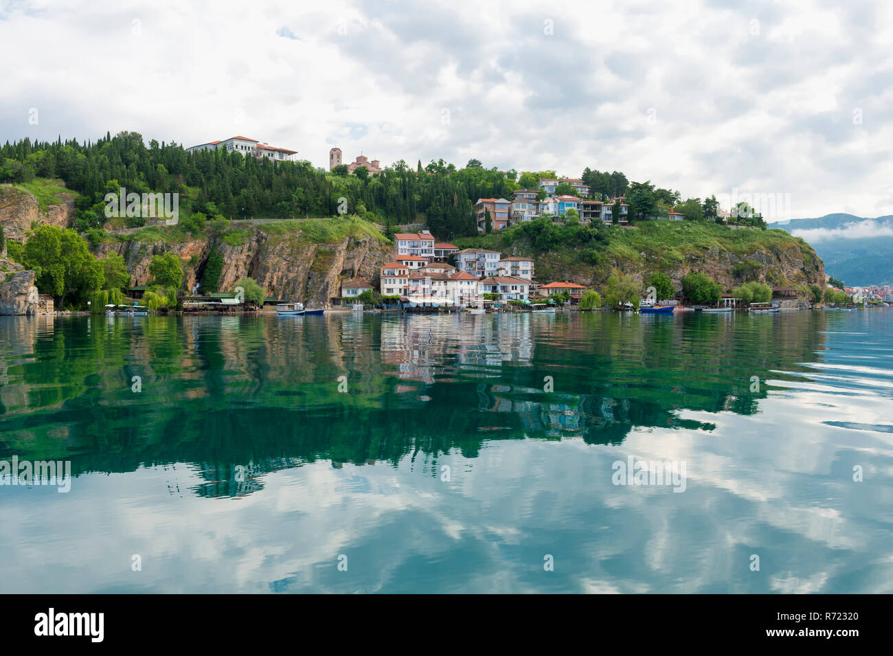 Ohrid old city reflecting in Lake Ohrid, Macedonia Stock Photo - Alamy