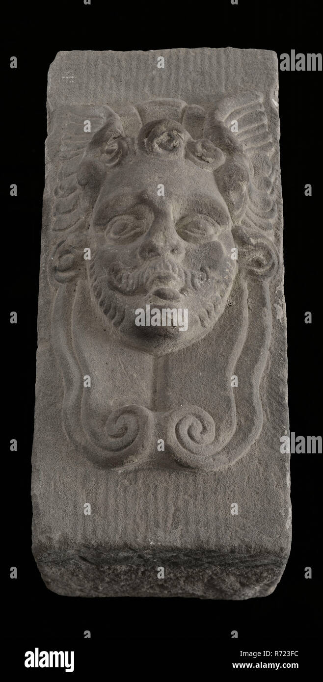 Keystone with gable head, male head with wings (Mercury?), keystone ...