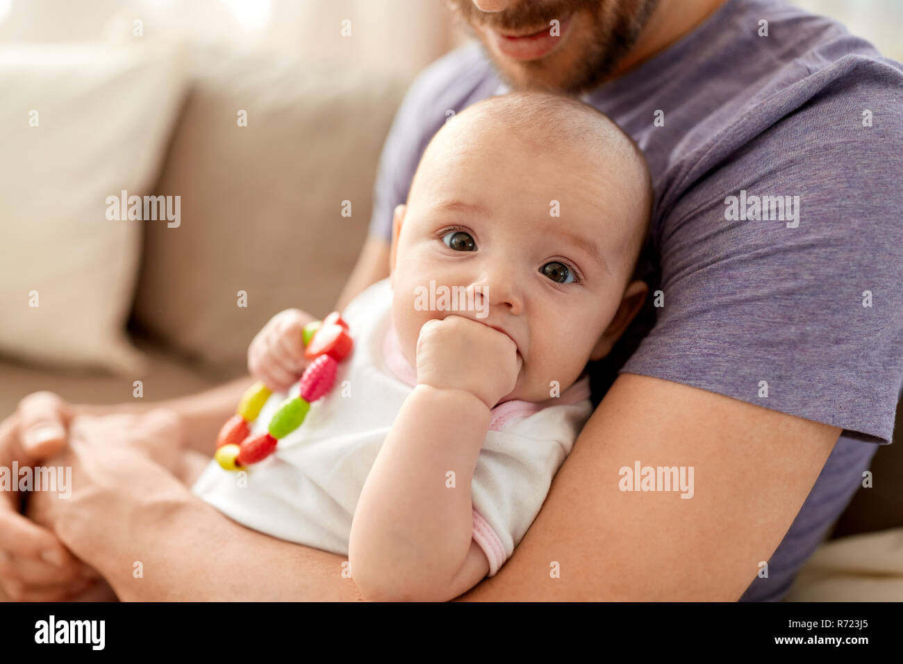 Teething baby girl hi-res stock photography and images - Alamy