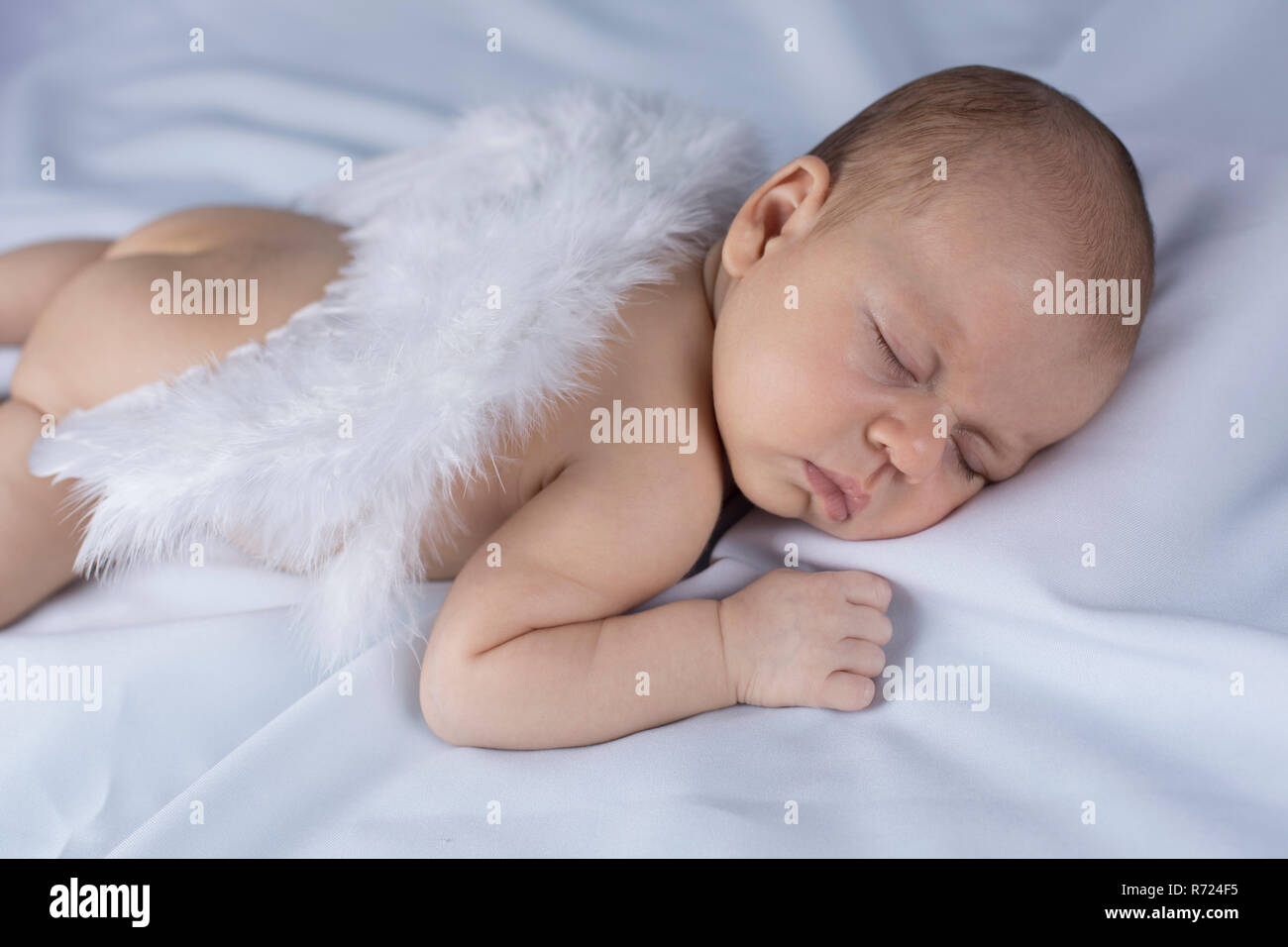 Baby sleeping, Angel Stock Photo - Alamy