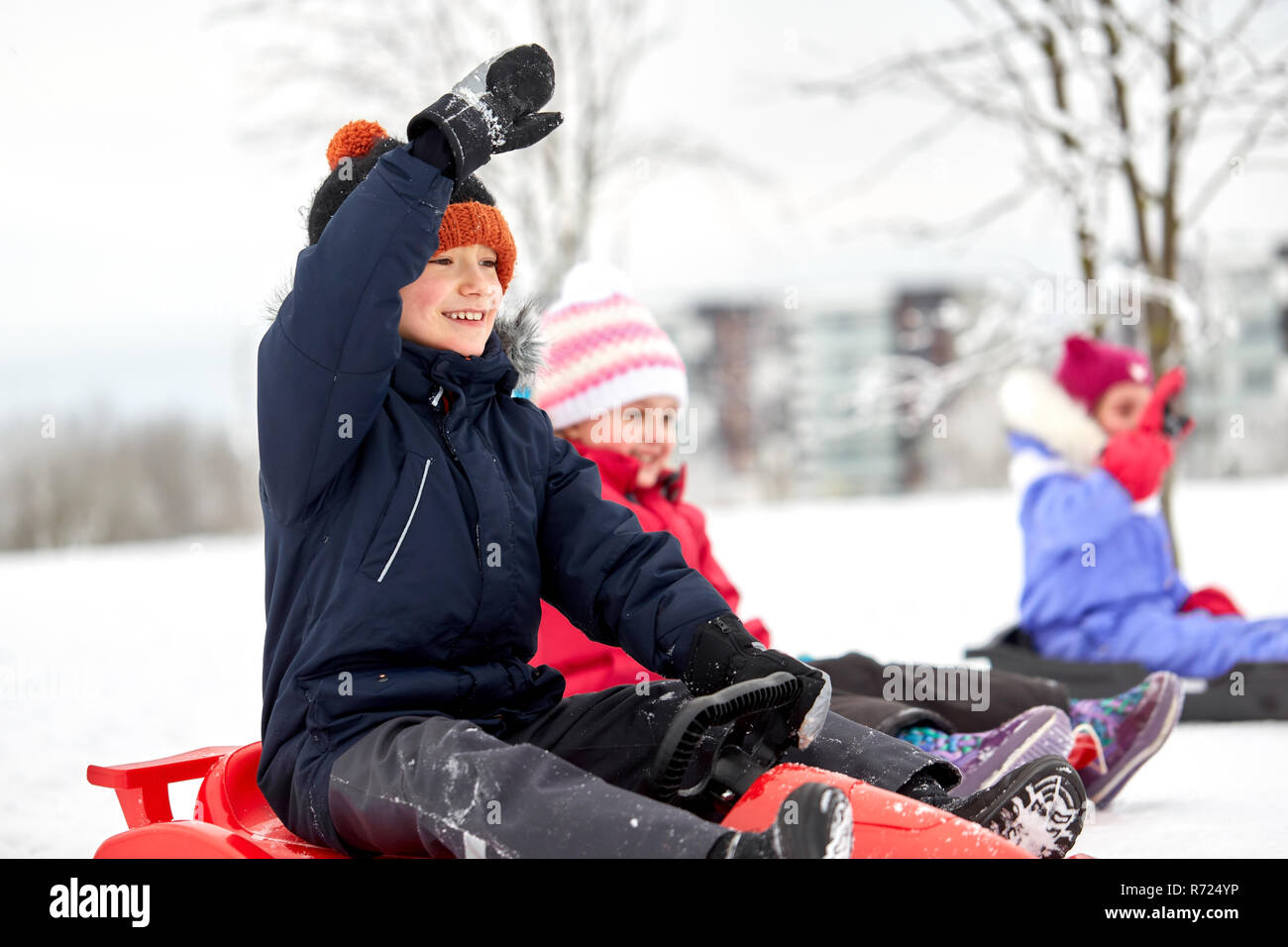 Group of kids sliding hi-res stock photography and images - Alamy