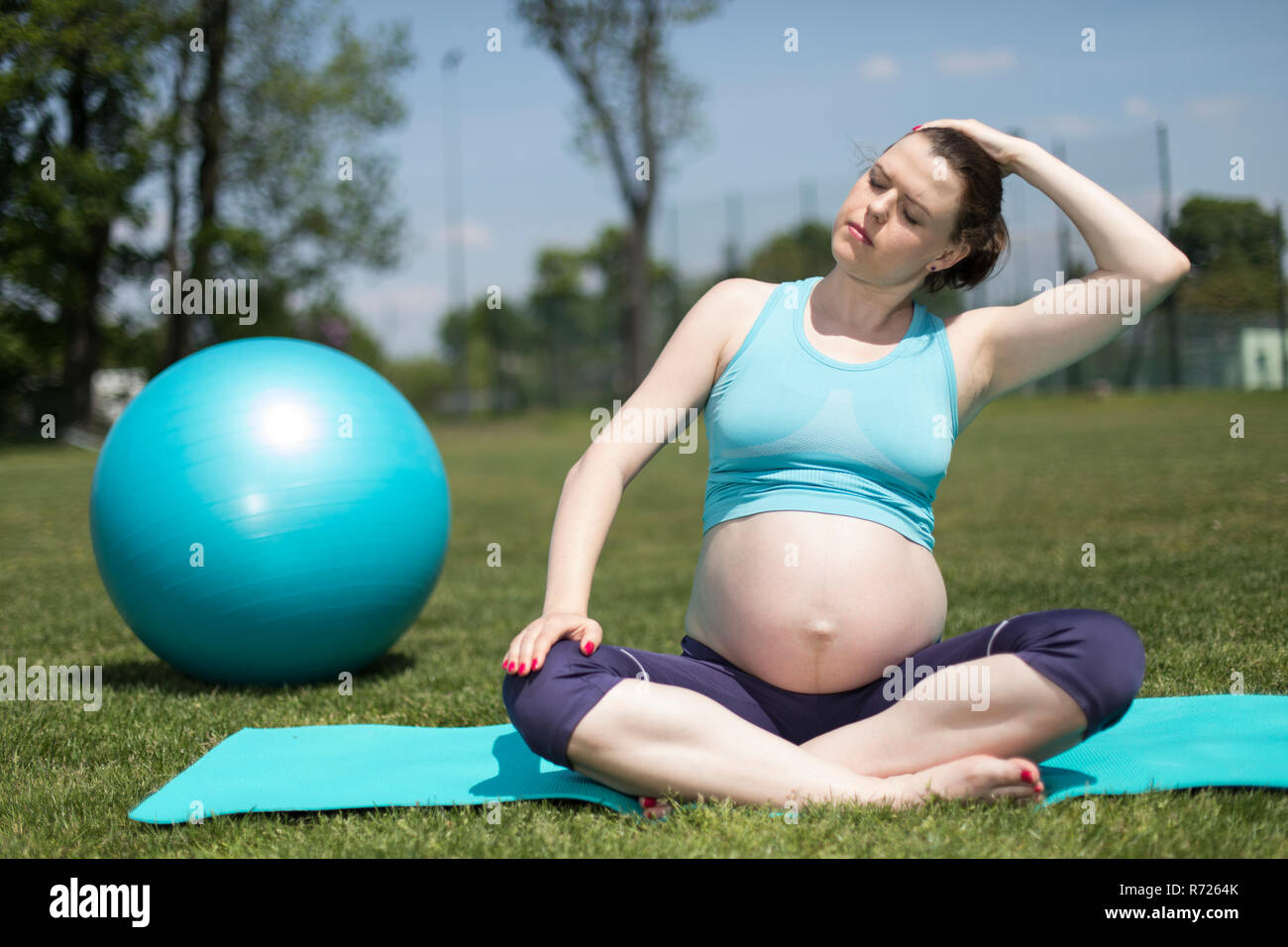 Pregnant women doing relaxation exercise Stock Photo - Alamy