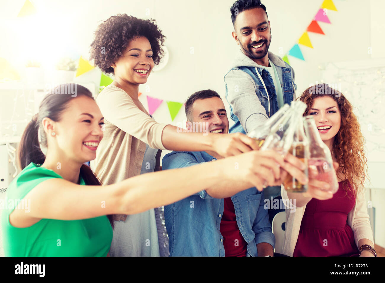 happy team with drinks celebrating at office party Stock Photo - Alamy
